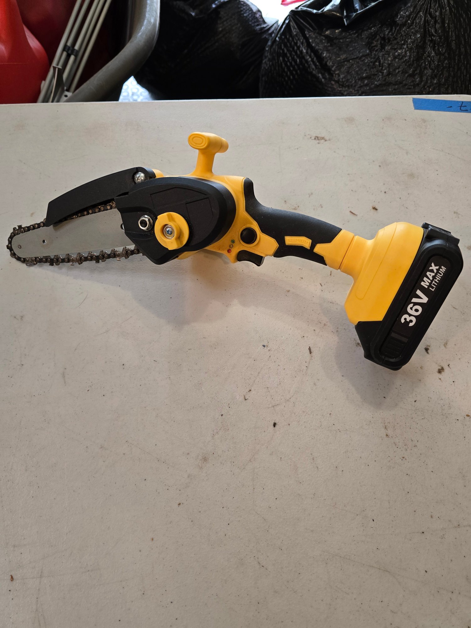 Battery Powered, Cordless Mini Chainsaw #66341 | Auctionninja.com