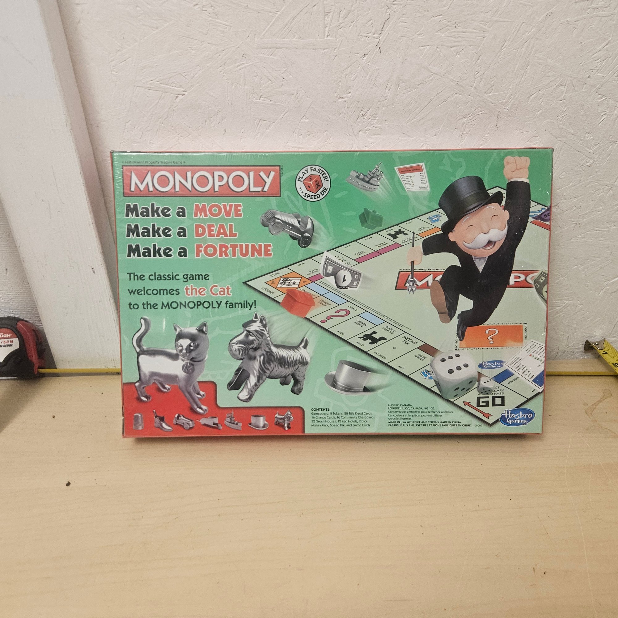 Monopoly Game Featuring The Newly Introduced Cat Token Classic Board ...