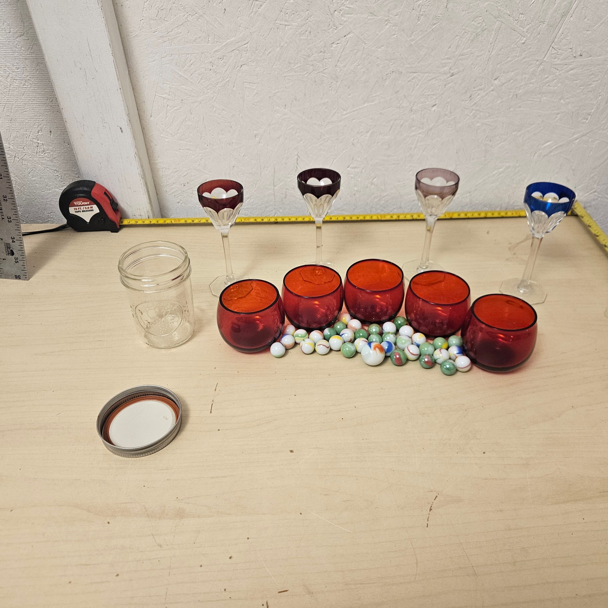 Assorted Glassware Red Glass Cups, Marbles, Glass Cup With Lid & Tall ...