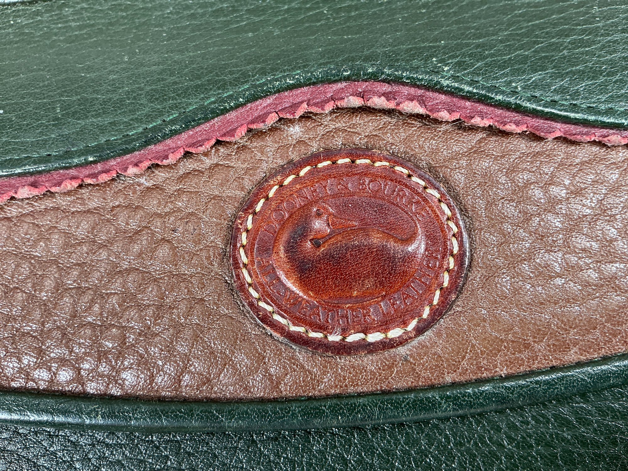 Dooney & Burke All Weather Leather Wallet #26982 | Auctionninja.com
