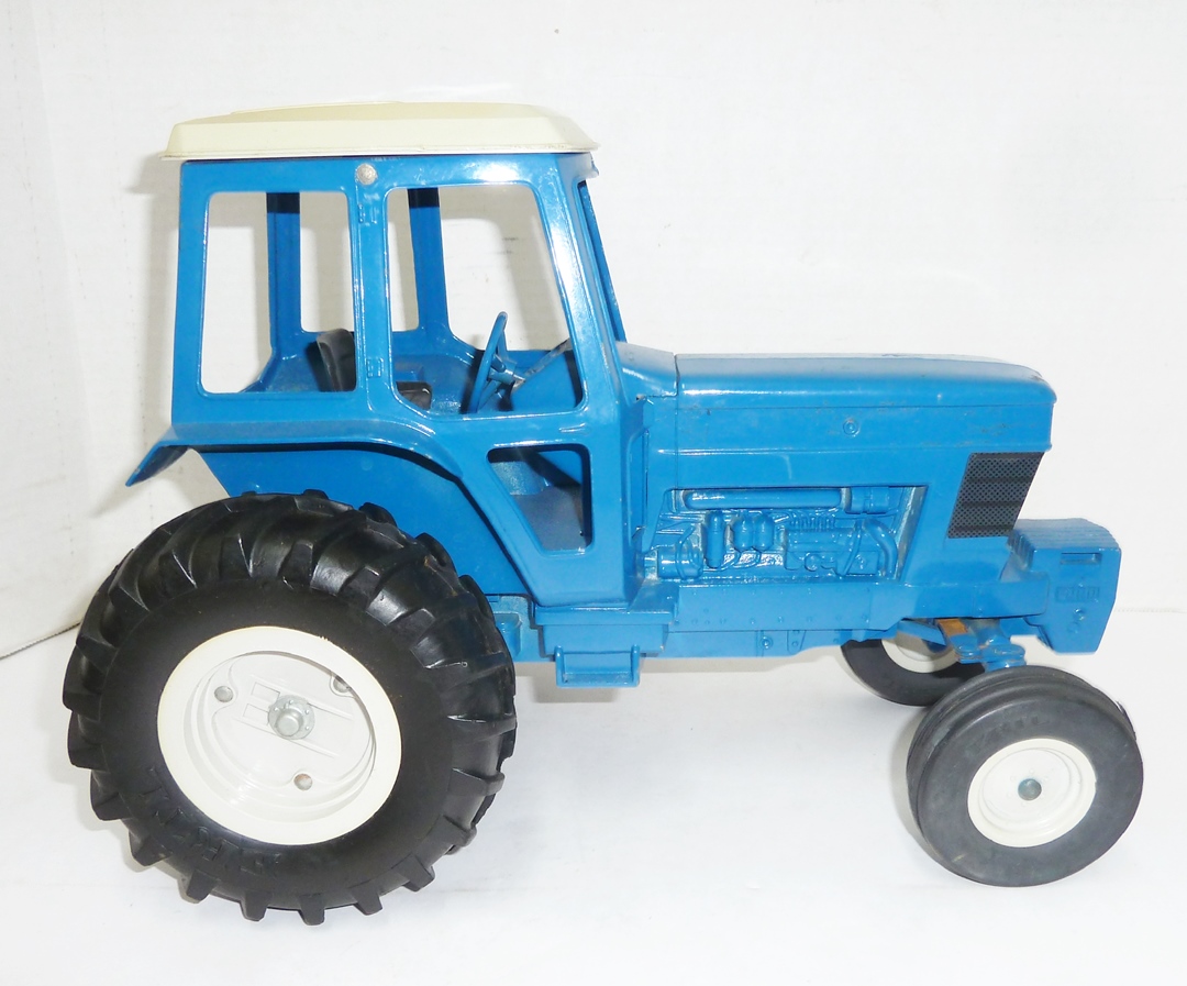 ERTL Blue Tractor, Vintage Metal Toy #8274 | Auctionninja.com