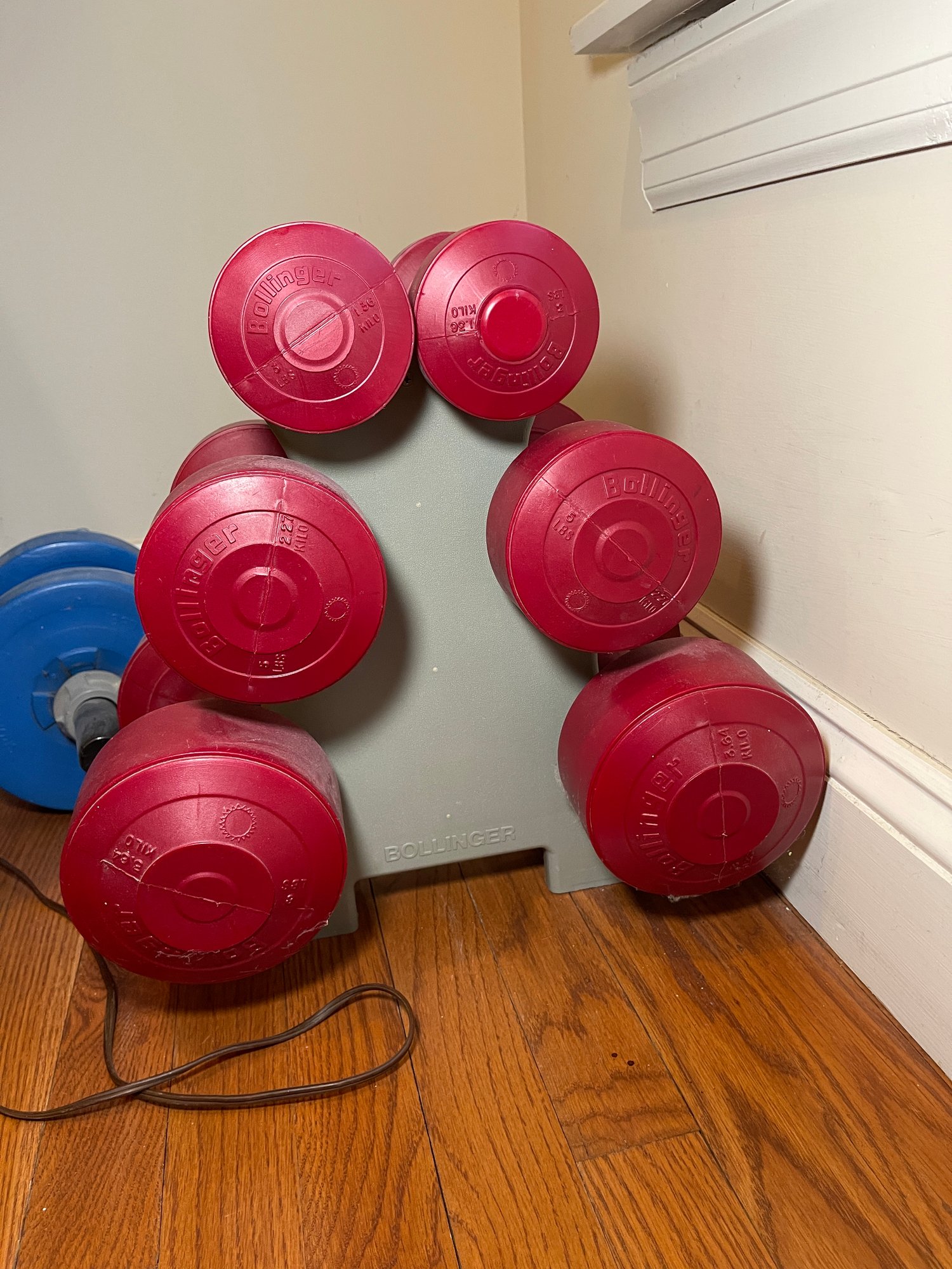 VINTAGE SET OF SIX BOLLINGER PLASTIC COVERED DUMBBELLS AND A BLUE ...