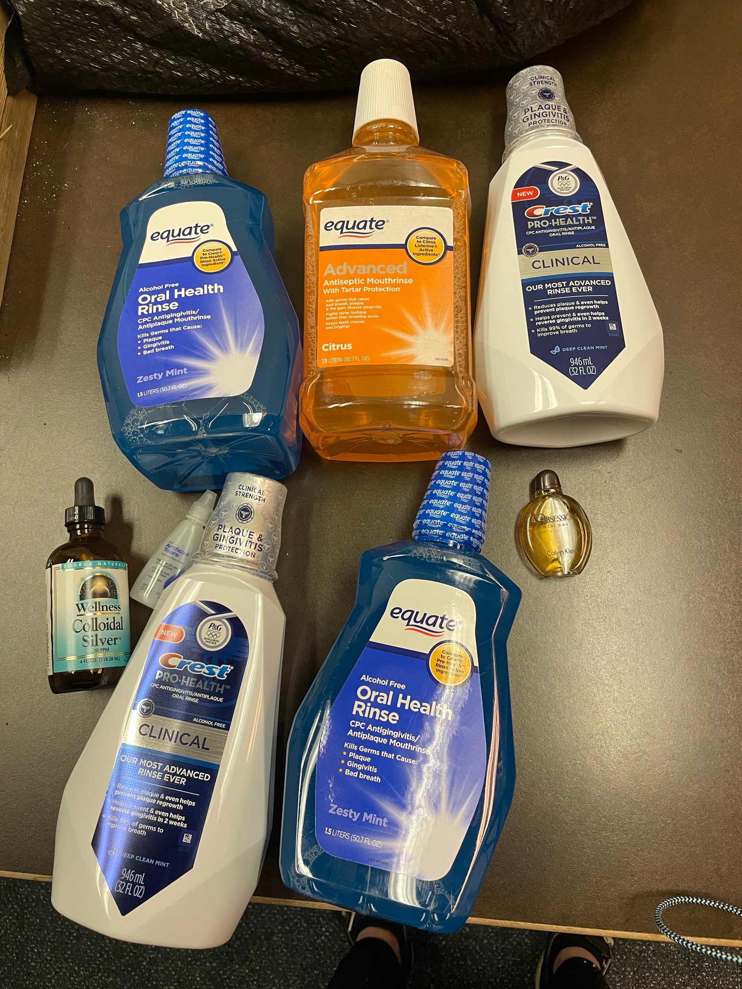 Variety Of Mouthwash, Colloidal Silver, Eye Drops, And Calvin Klein ...