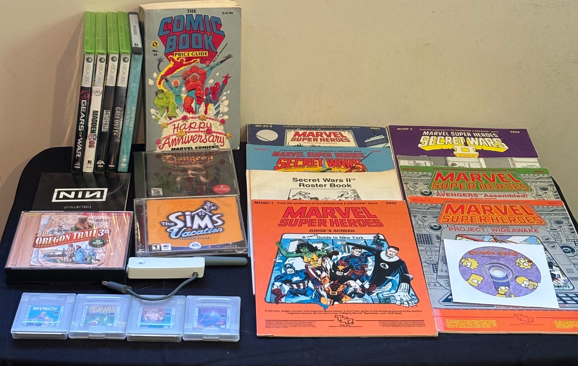 R9 Marvel Super Heroes Booklets, The Simpsons Cartoon Studio CD-ROM ...