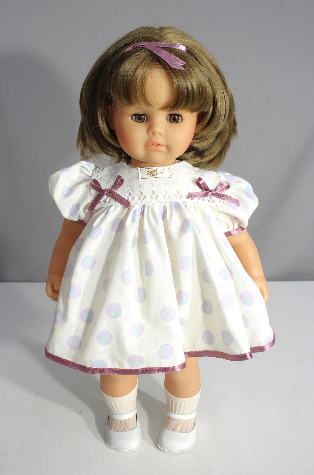 18" Zapf Creation Doll With Polka Dot Dress #75991 | Auctionninja.com
