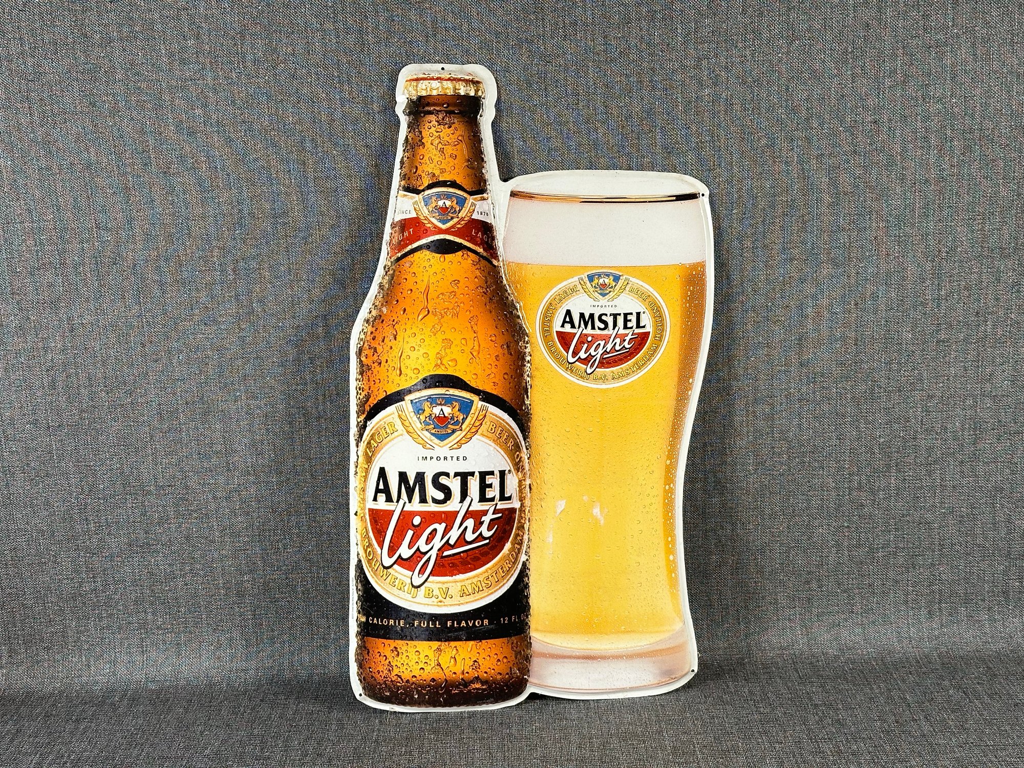 Home Bar Decor: Amstel Light Wall Sign In Tin #1913446 | Auctionninja.com