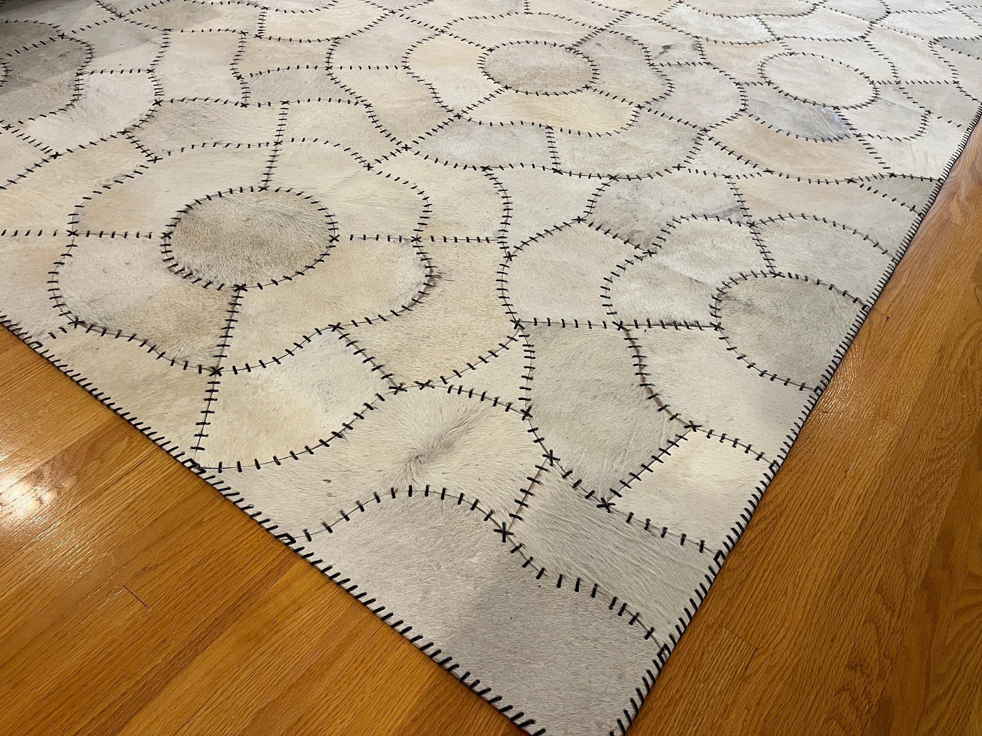 A Handstitched Large Patchwork Hide Rug - Floral Pattern #40846897 ...