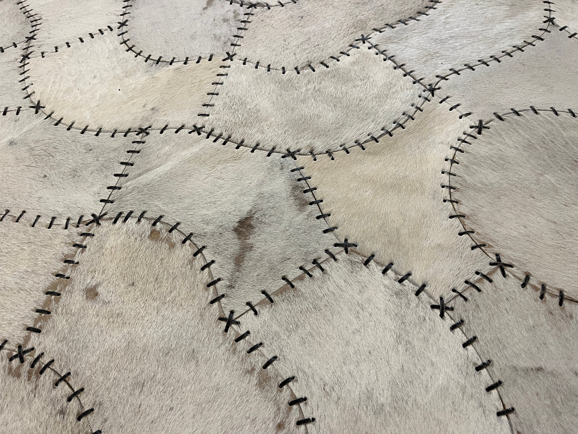 A Handstitched Large Patchwork Hide Rug - Floral Pattern #40846897 ...