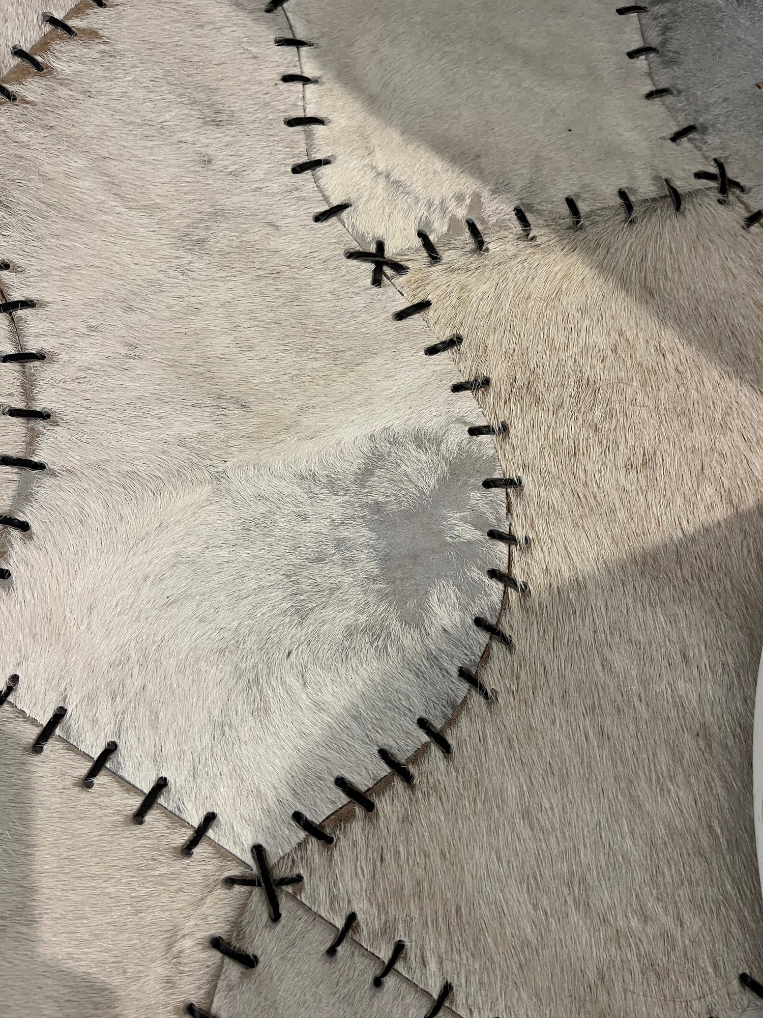 A Handstitched Large Patchwork Hide Rug - Floral Pattern #40846897 ...