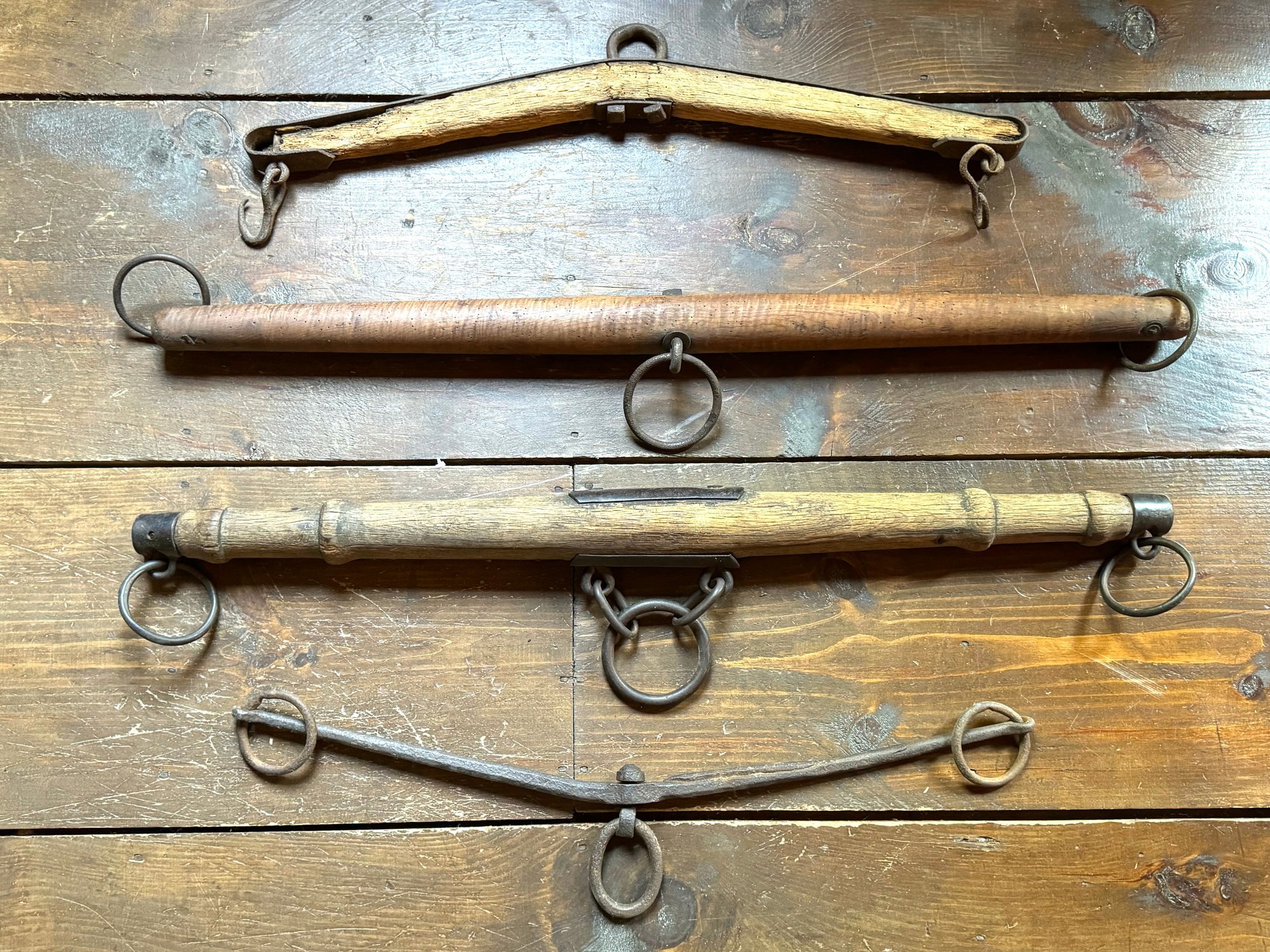 Three Antique Primitive Ox Yokes & Iron Harness #1950543 | Auctionninja.com