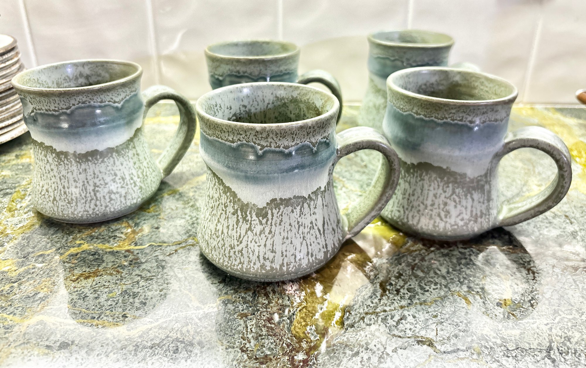 Four Stoneware Mugs #1982589 | Auctionninja.com