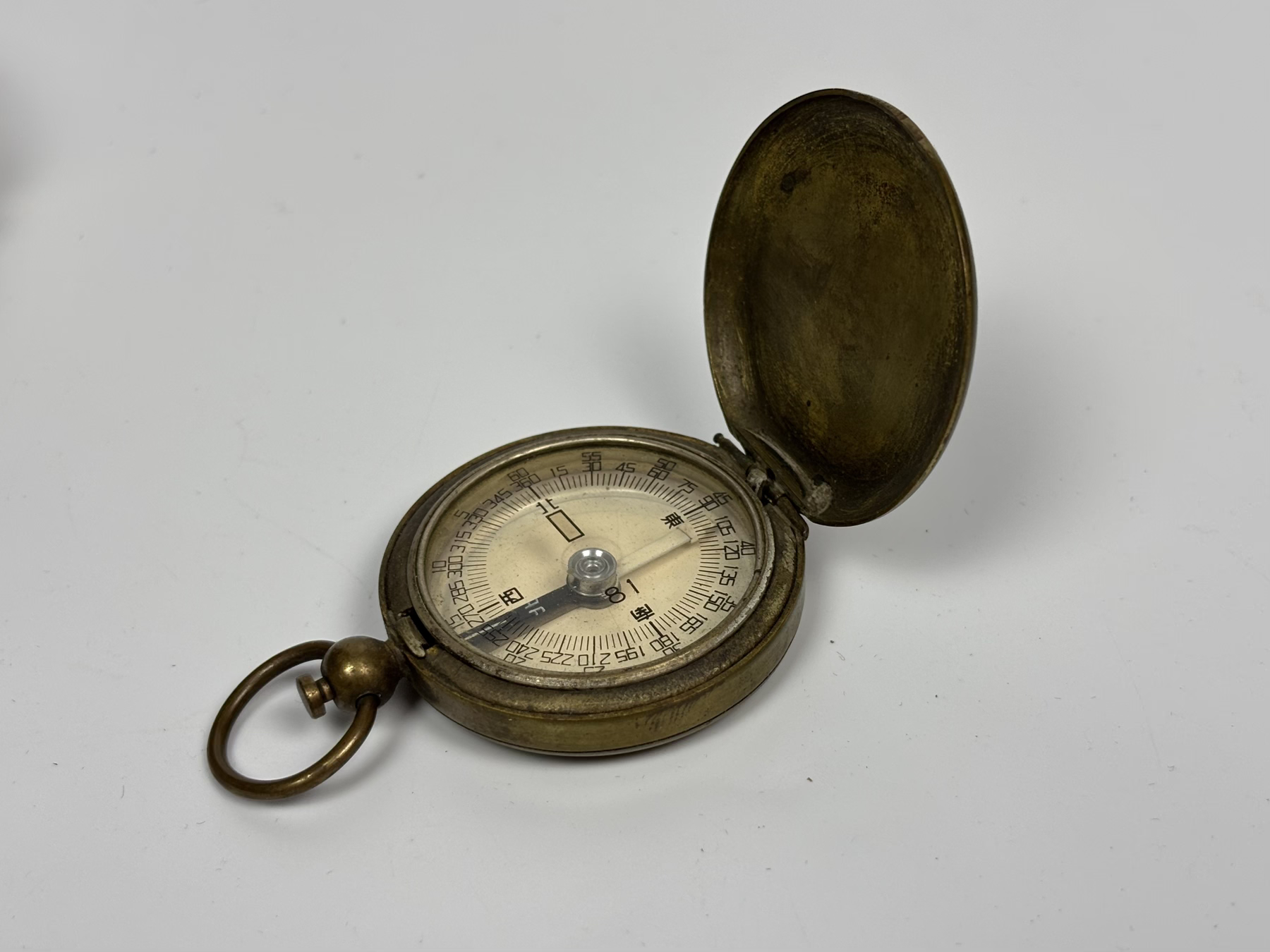 A Vintage Omega Swiss Watch And An Antique Brass Compass #40870313 ...