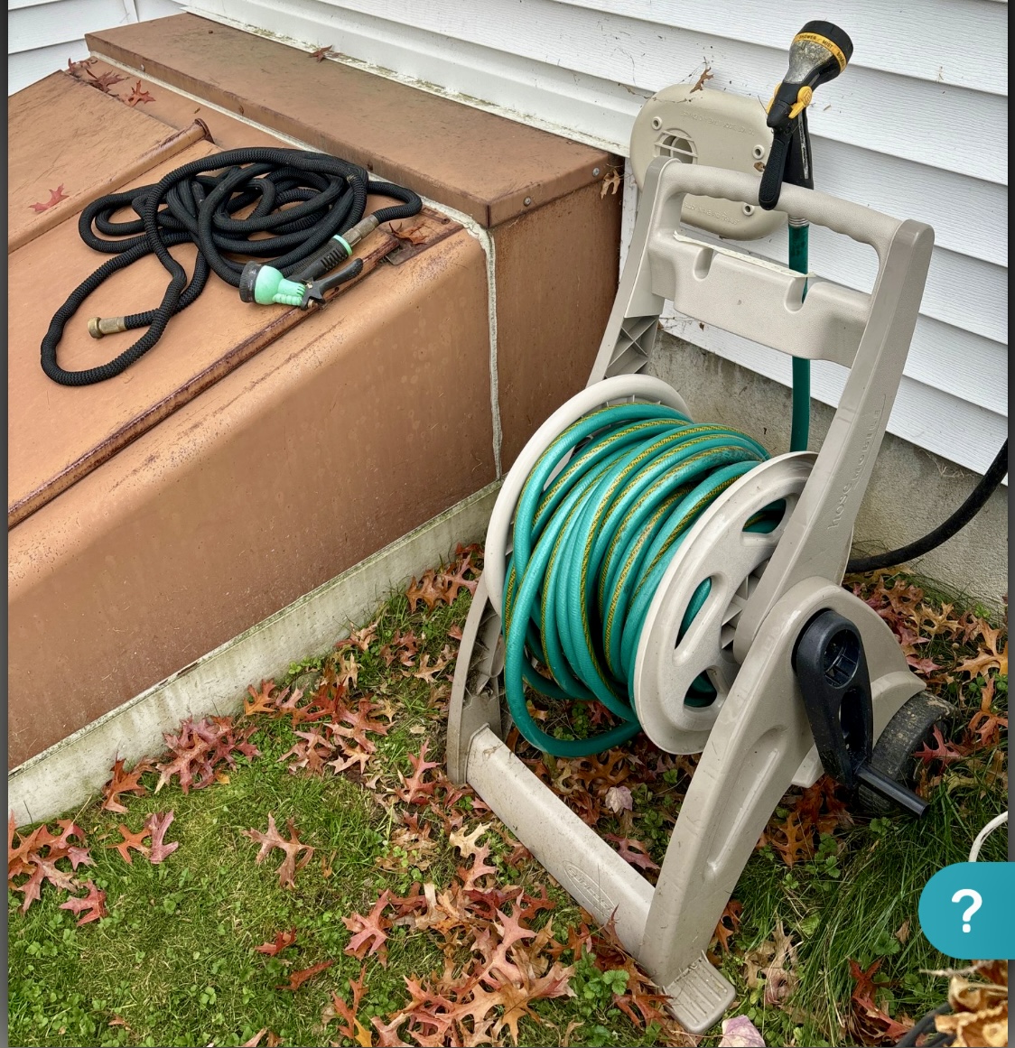2 Garden Hoses With Nozzles, One On Hose Storage Wheel. BY #1998552 ...