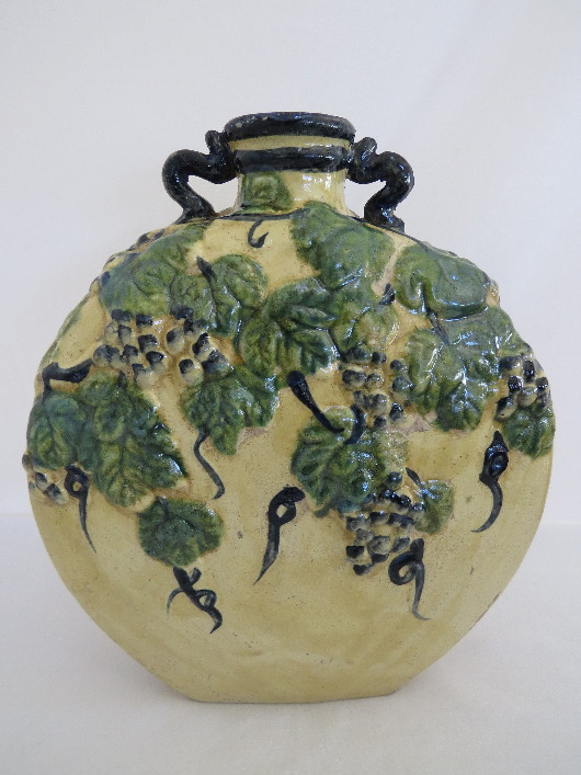 A Stoneware Vessel With Raised Grape Vine Design #1807834 ...