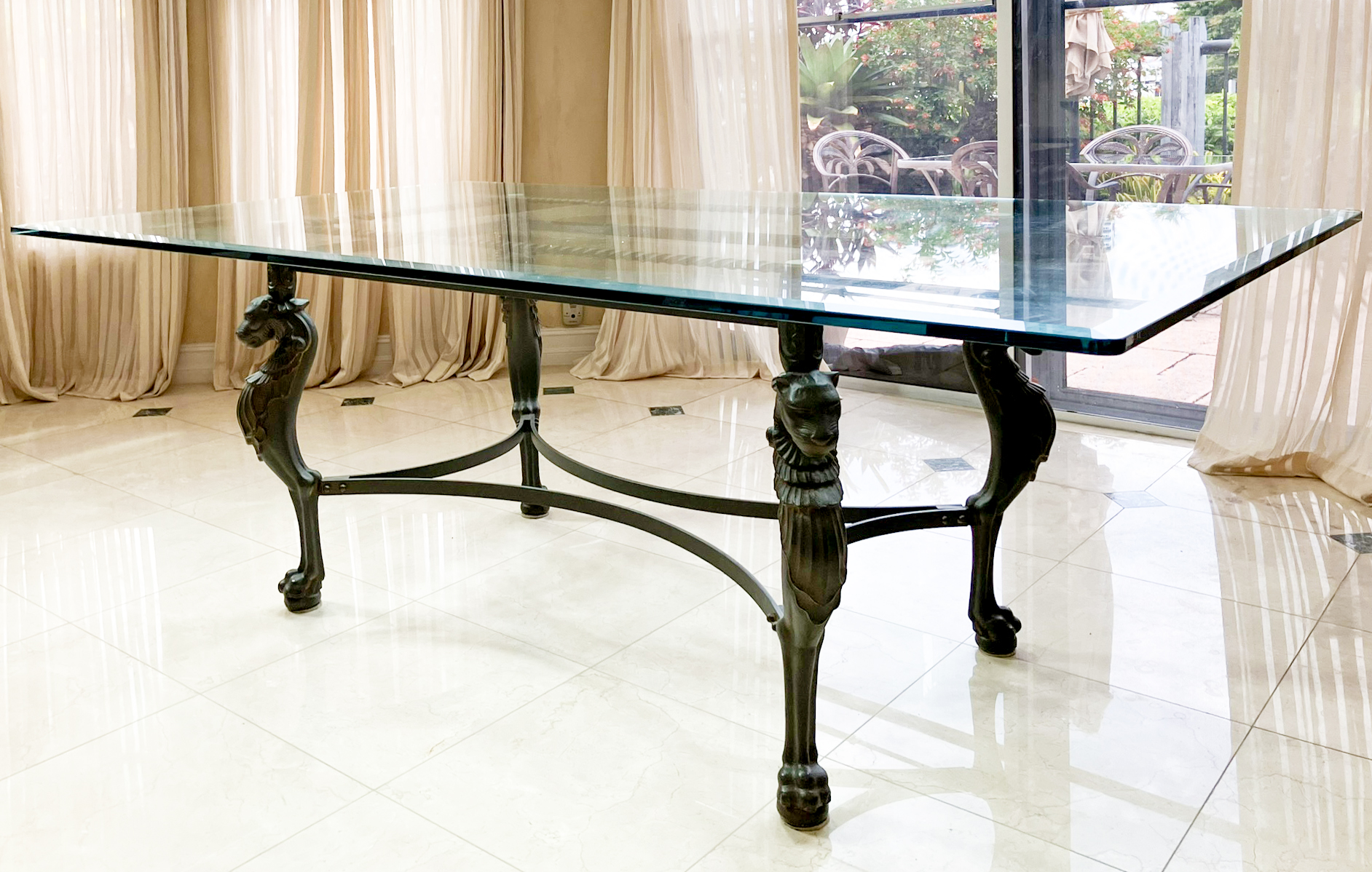 A Bronze Dining Table Base With Large Griffon Form Legs And A Glass Top ...