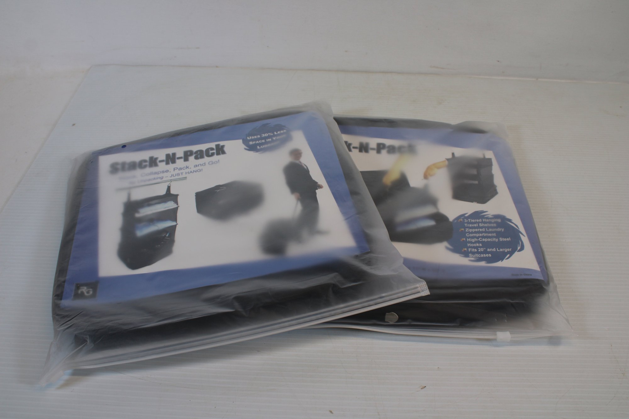 Pair Of New Stack N' Pack Collapsible Luggage #1938263 | Auctionninja.com