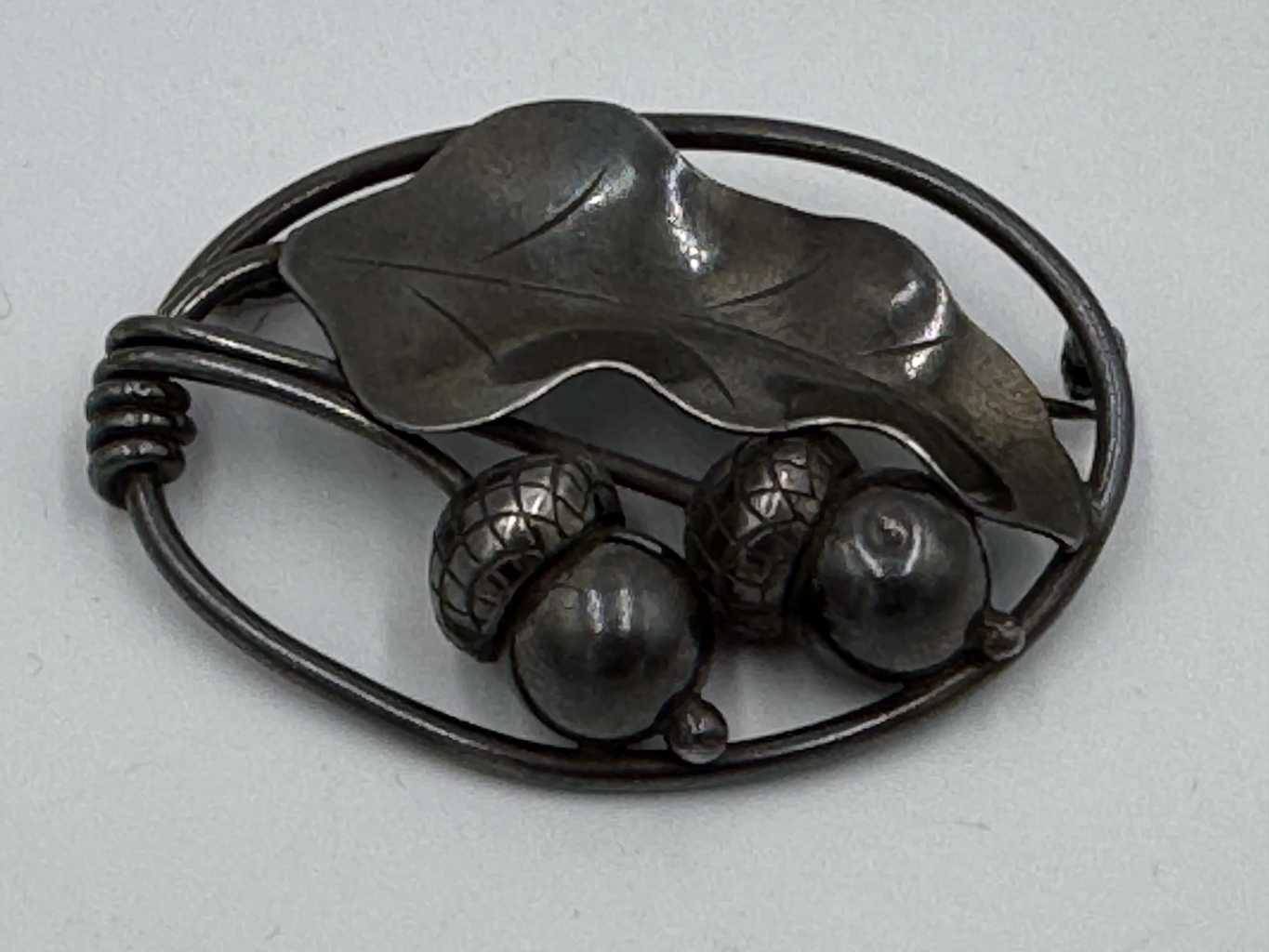 A GEORGE JENSEN STERLING SILVER PIN #2054903 | Auctionninja.com