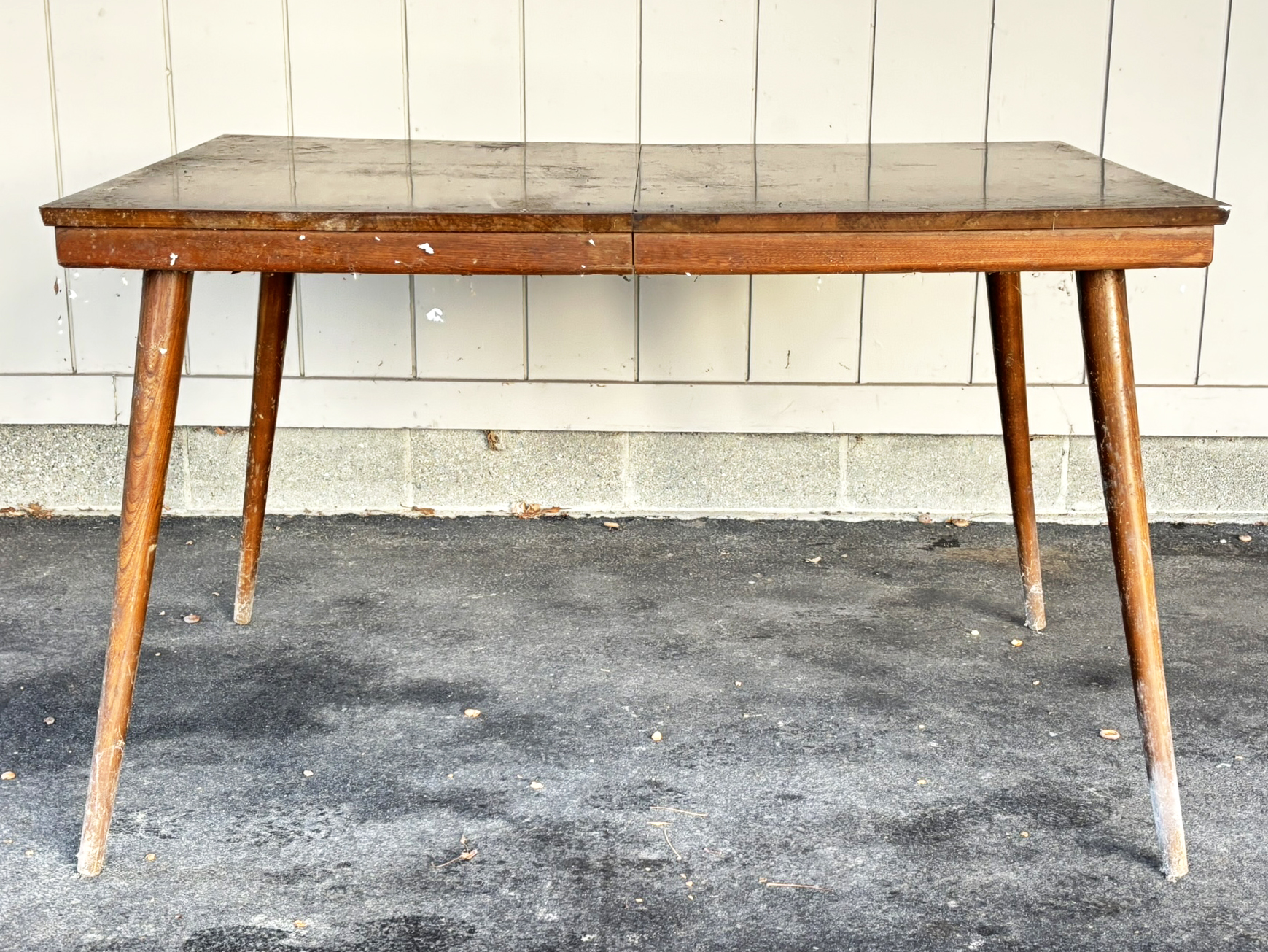 A Vintage Extendable Dining Table Clad In Formica With Stick Legs ...