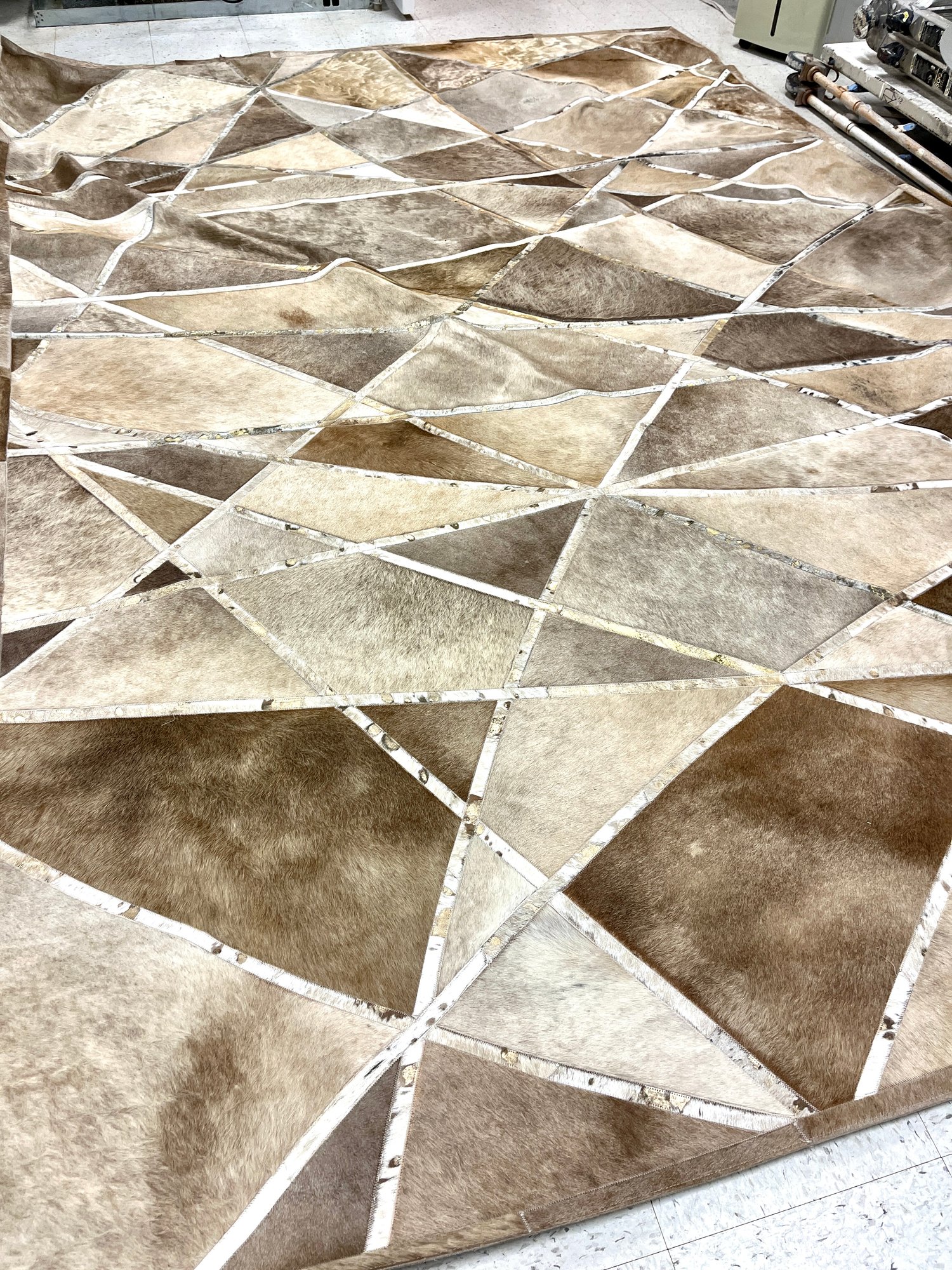 An Allure Contemporary Cow Hide Patchwork Rug With Gold Detail ...