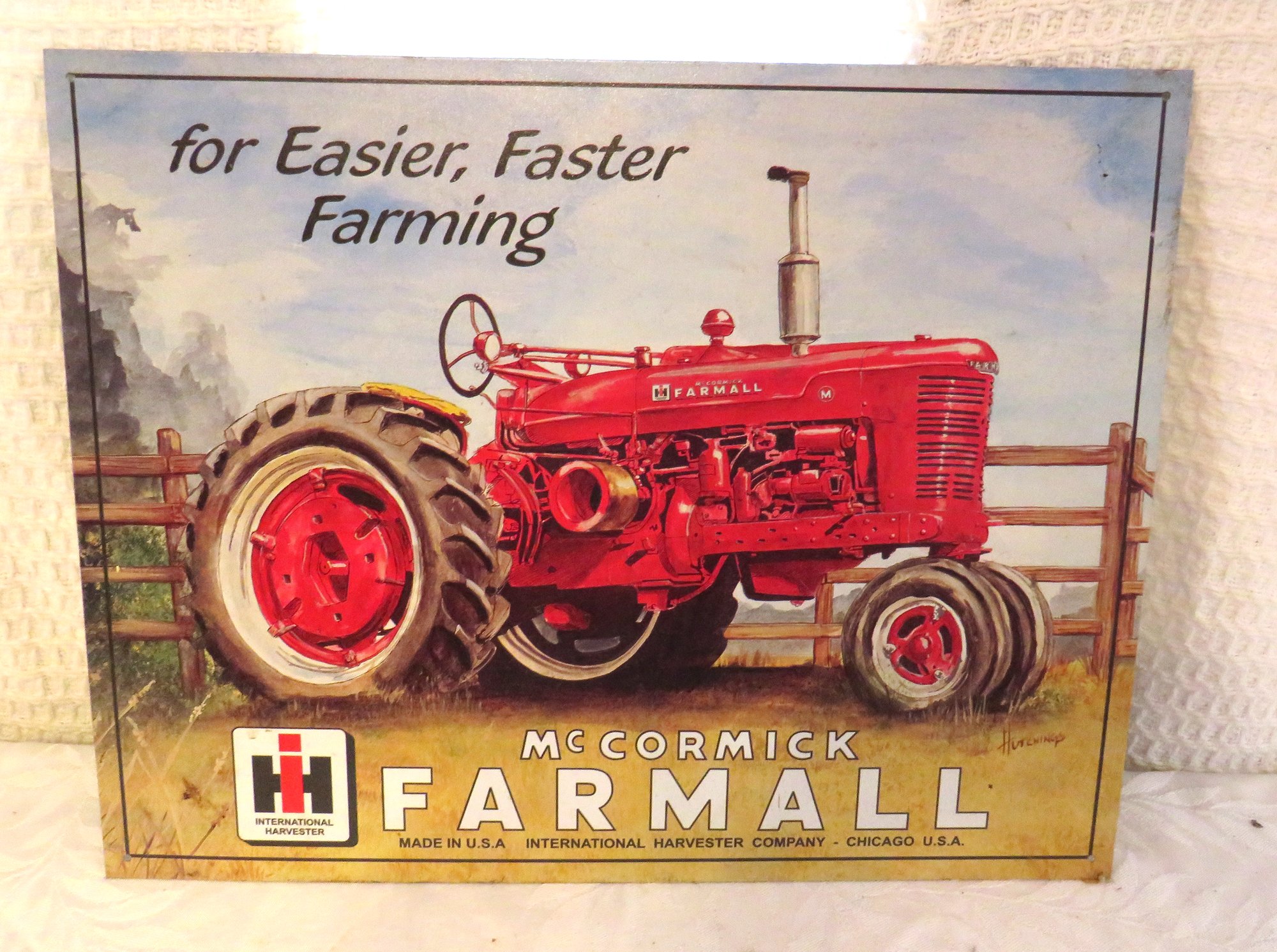 Metal McCormick Farmall Tractor Sign #1952504 | Auctionninja.com