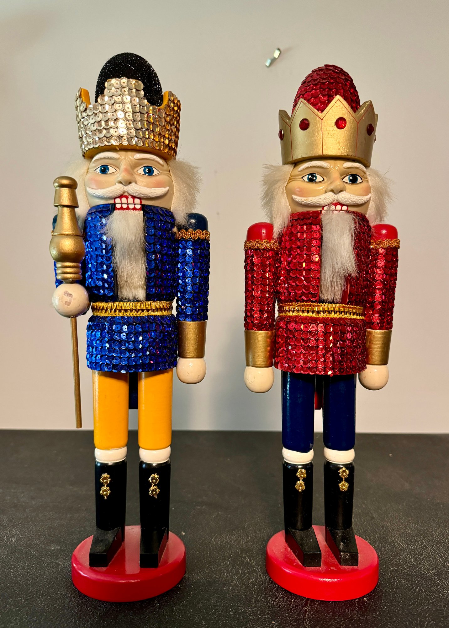 Pair Of Colorful Wooden Nutchrackers #1960241 | Auctionninja.com