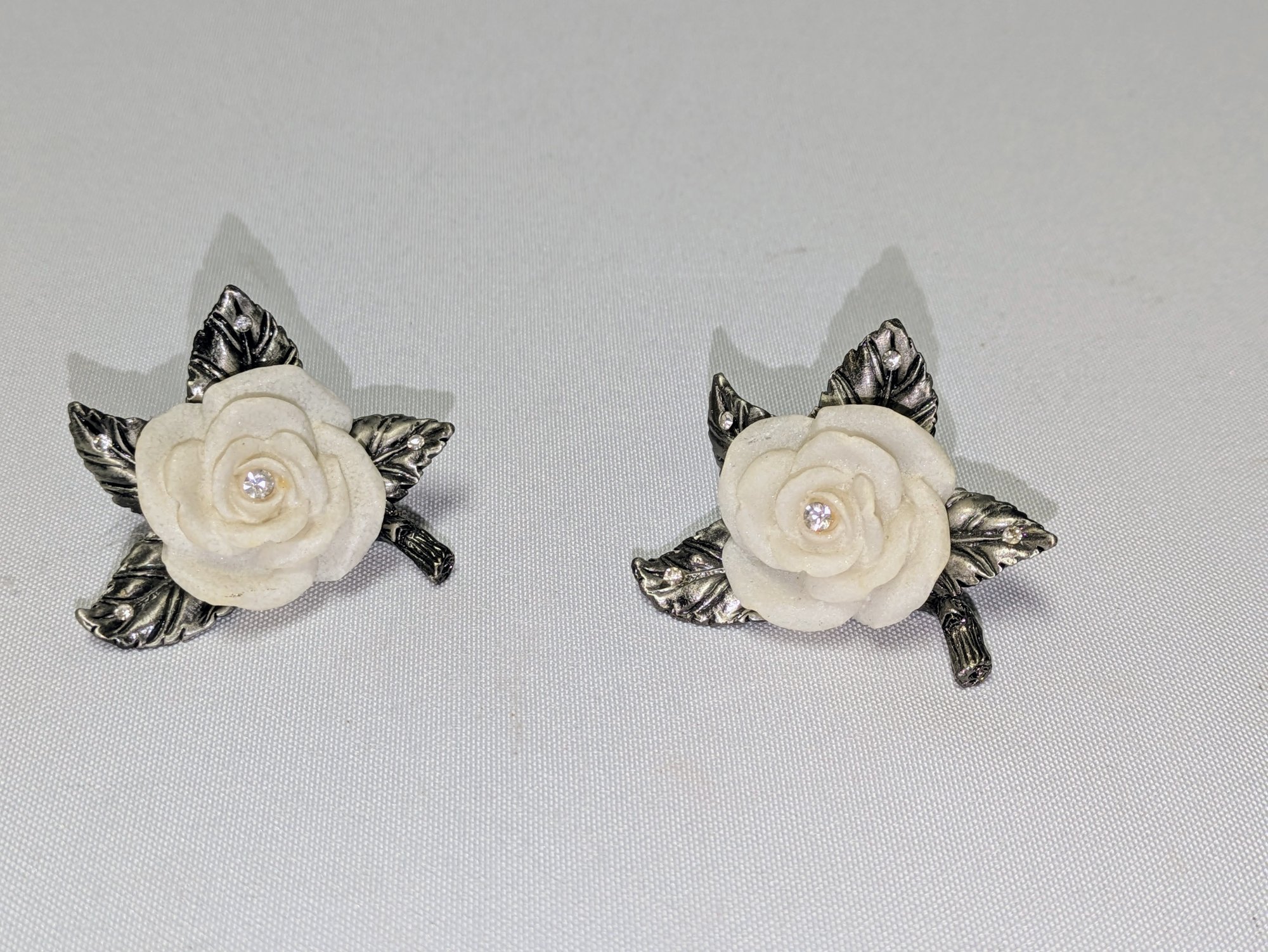 Vintage Pair Of Carved Stone Roses Set On A Pewter Branch With ...
