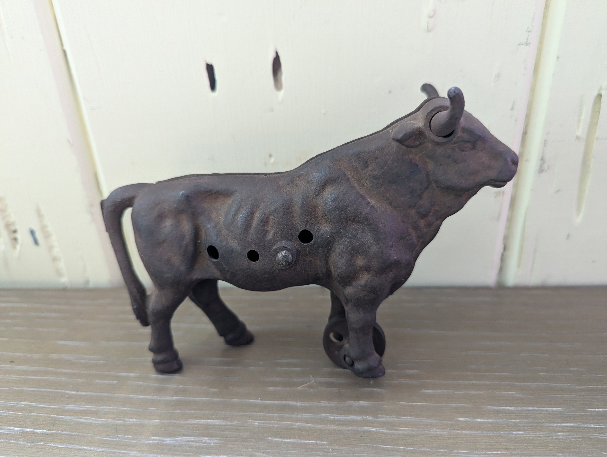 Antique? Caste Iron Bull With Wheel Between Legs #2240467 ...