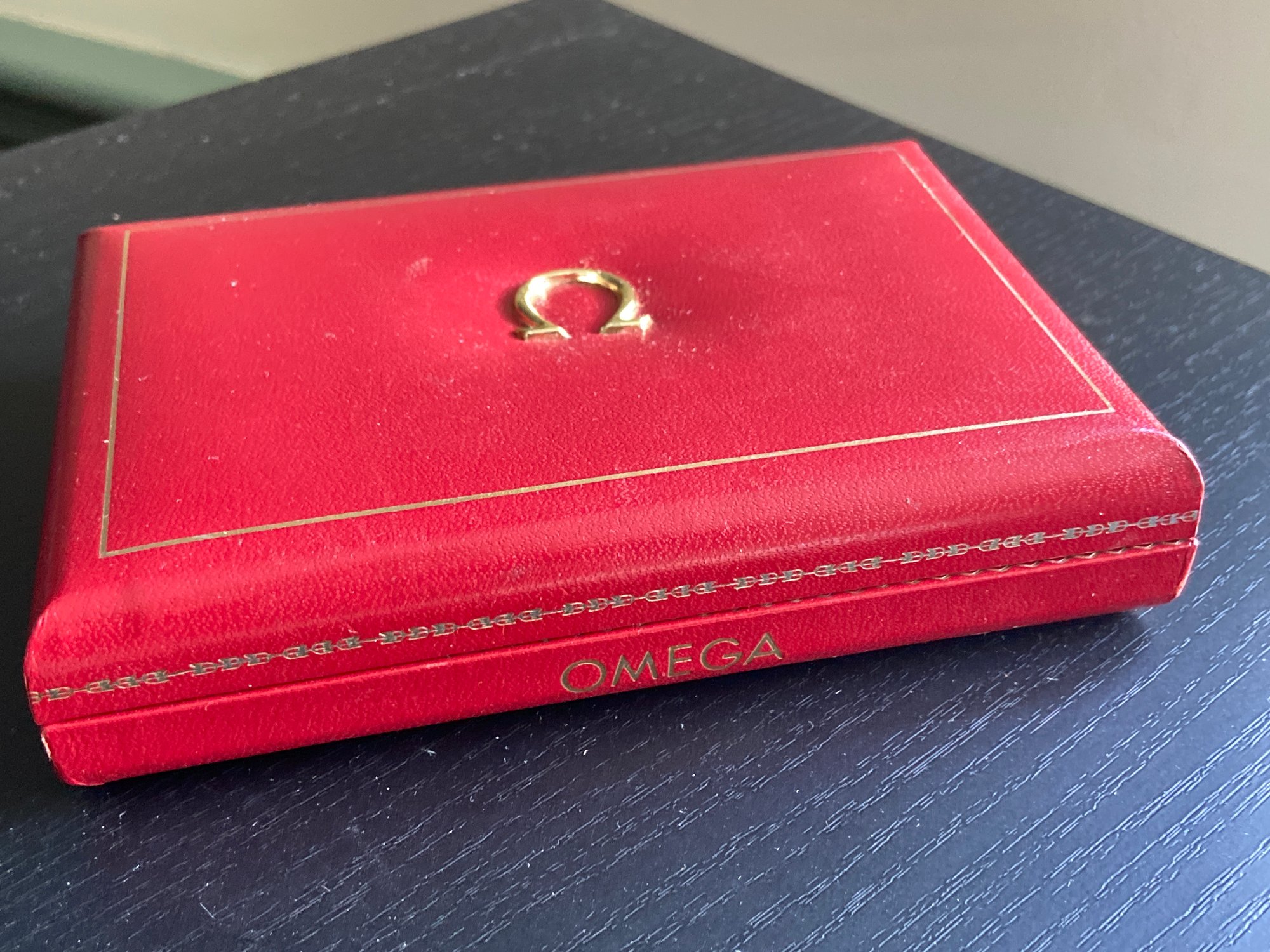 Omega Red Box And Tan Leather Watch Bands #1973745 | Auctionninja.com