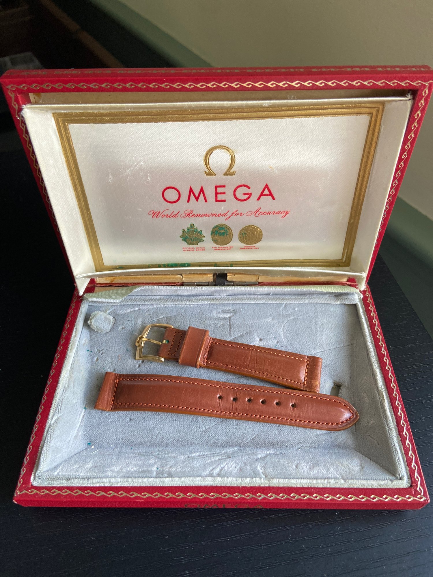 Omega Red Box And Tan Leather Watch Bands #1973745 | Auctionninja.com