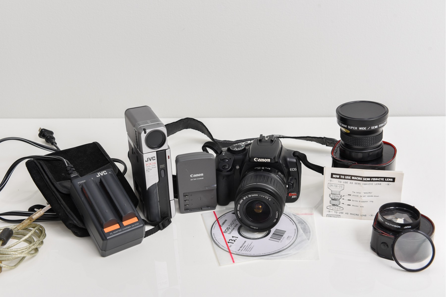 Canon Camera Model E05, JVC Digital Video Camera Model GR-DV1U, Two ...