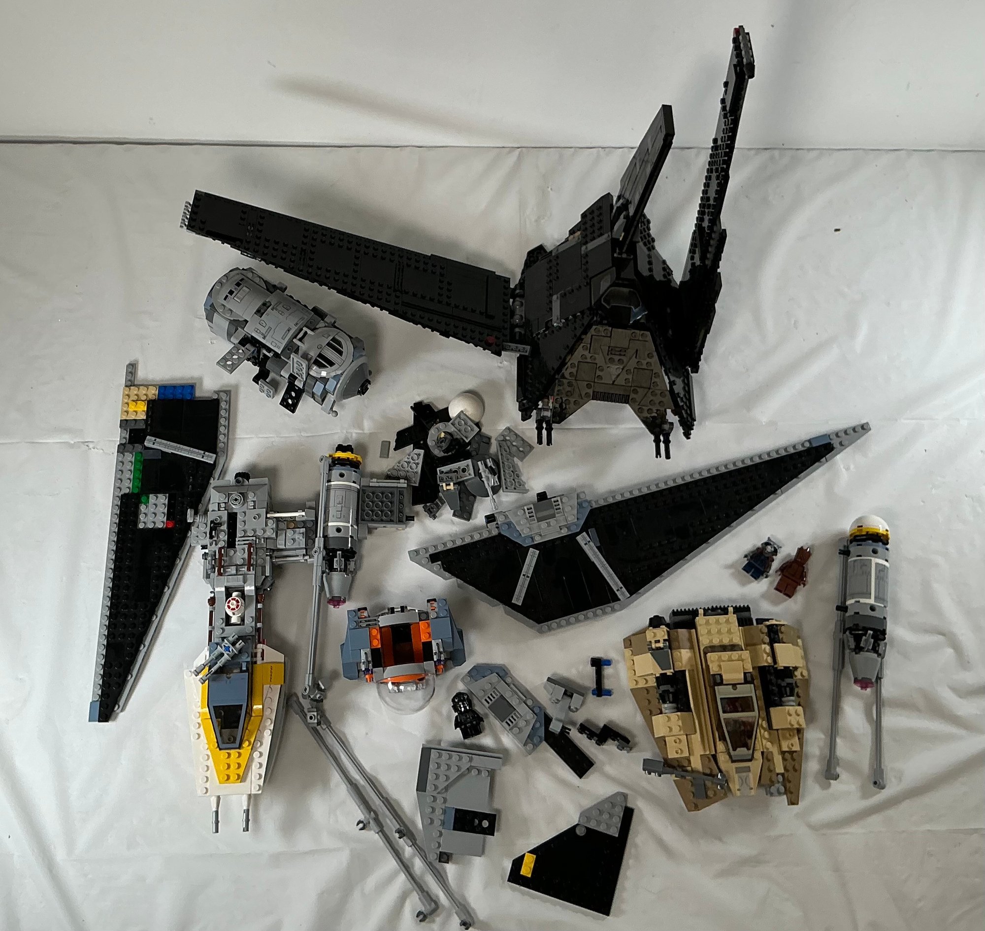 Assorted Pieces Of A Star Wars? Lego Set With Minifigures And Marvel ...