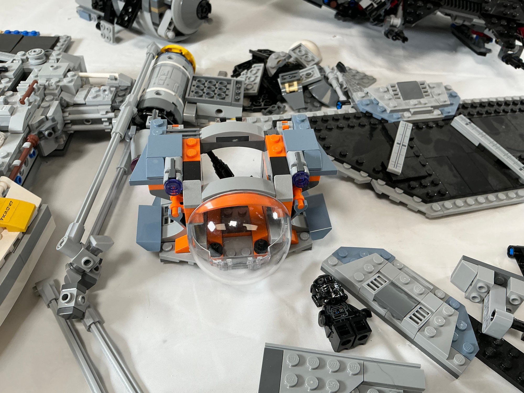 Assorted Pieces Of A Star Wars? Lego Set With Minifigures And Marvel ...