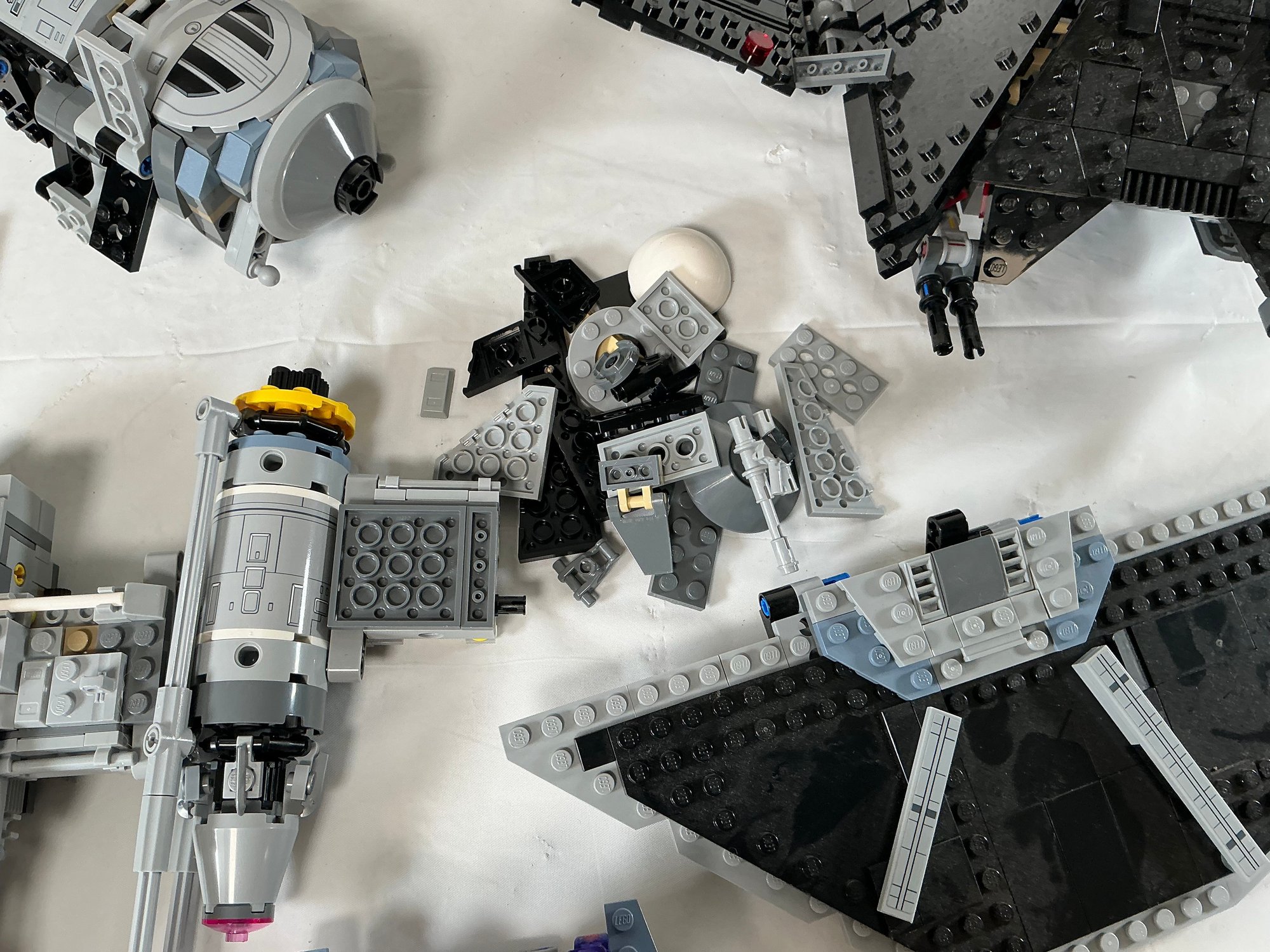 Assorted Pieces Of A Star Wars? Lego Set With Minifigures And Marvel ...