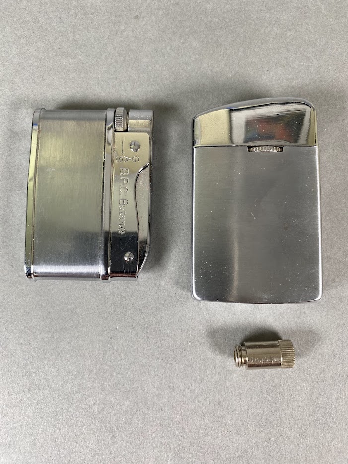 Two Vintage Lighters By Zaima And B P C Butane #5450 | Auctionninja.com