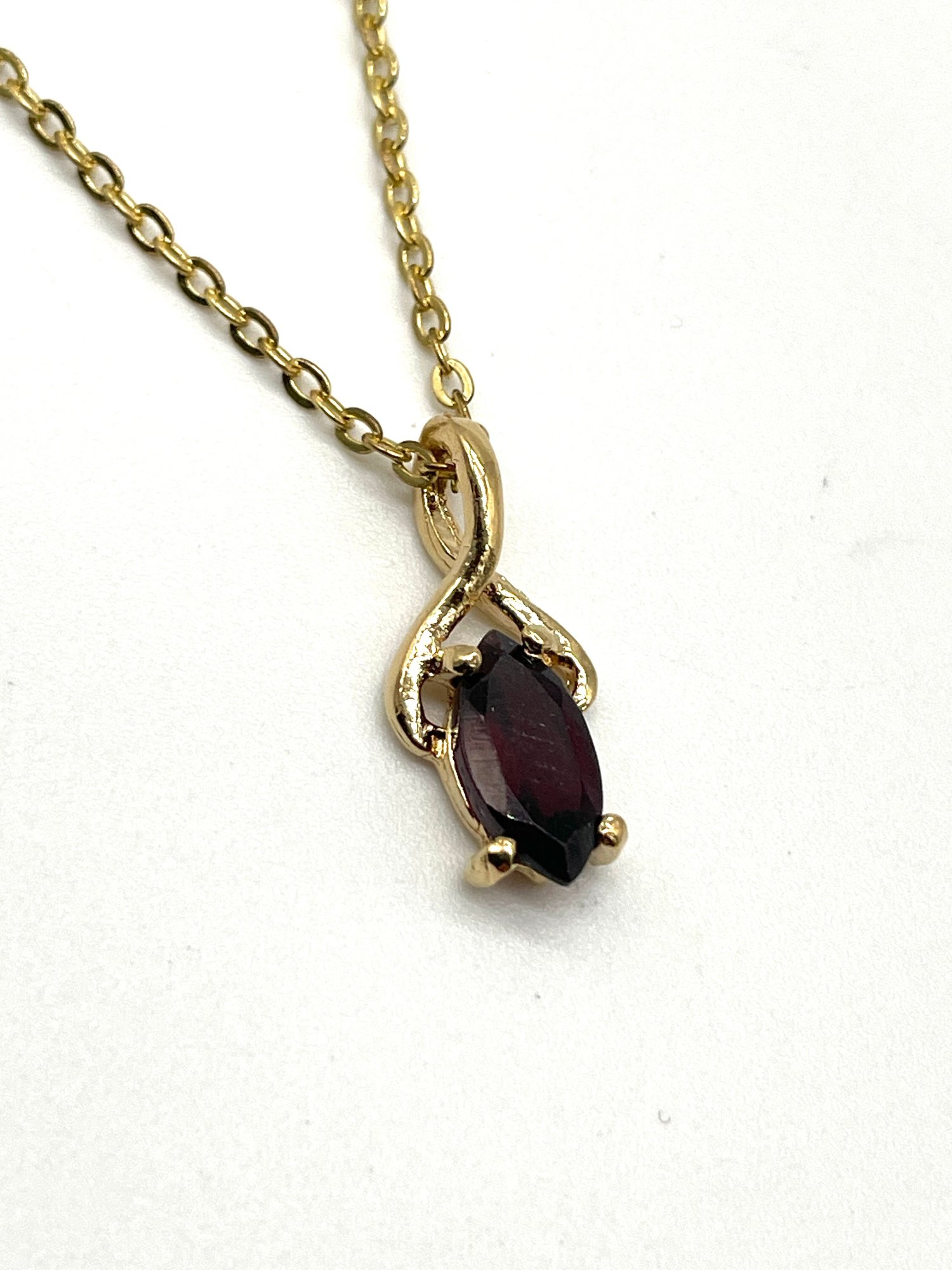 Goldtone Necklaces. Garnet Pendant. Goldtone Pierced Earrings Hoops ...