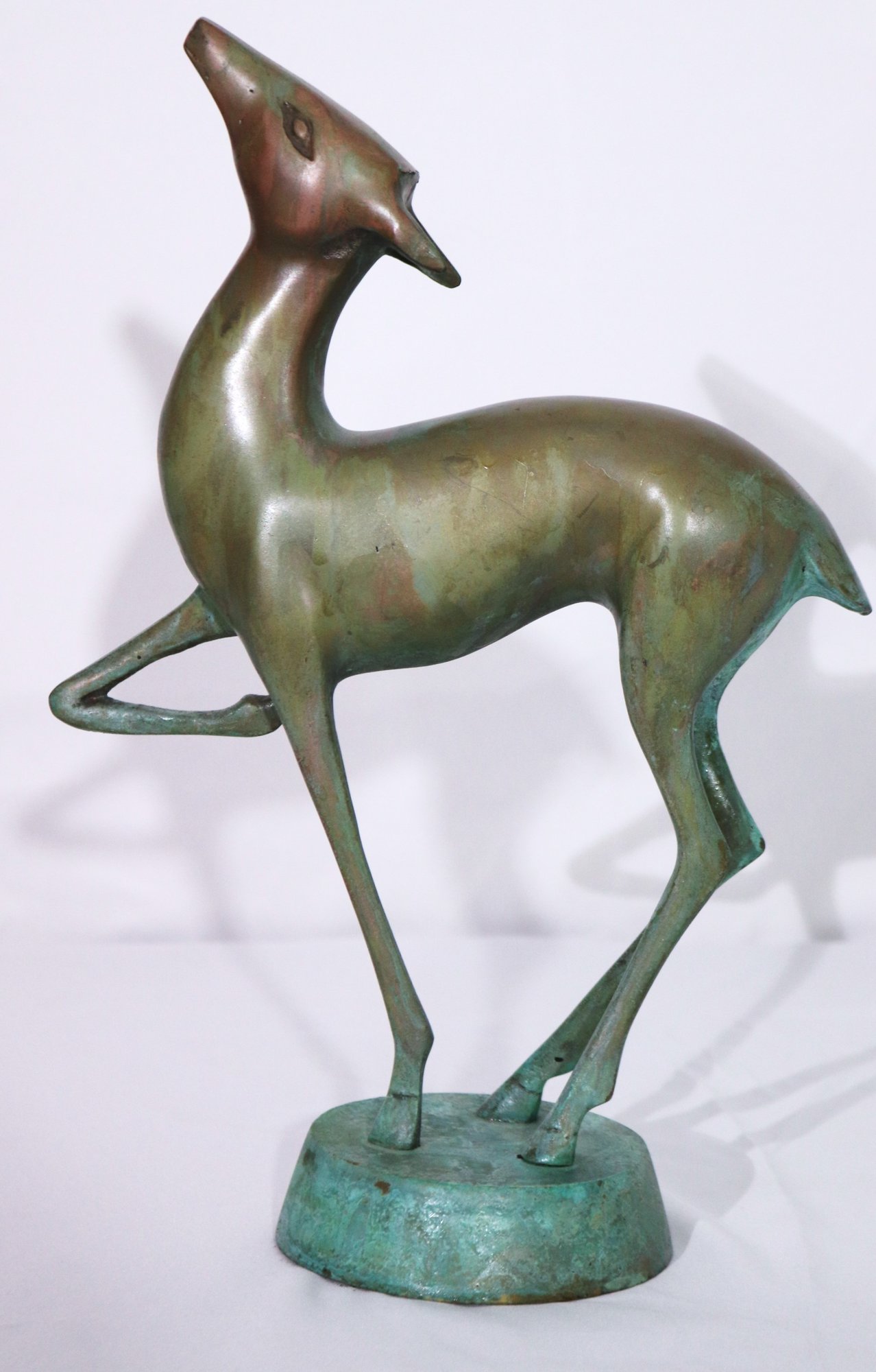Art Deco Style Prancing Deer With A Green Patina. #51864 | Auctionninja.com