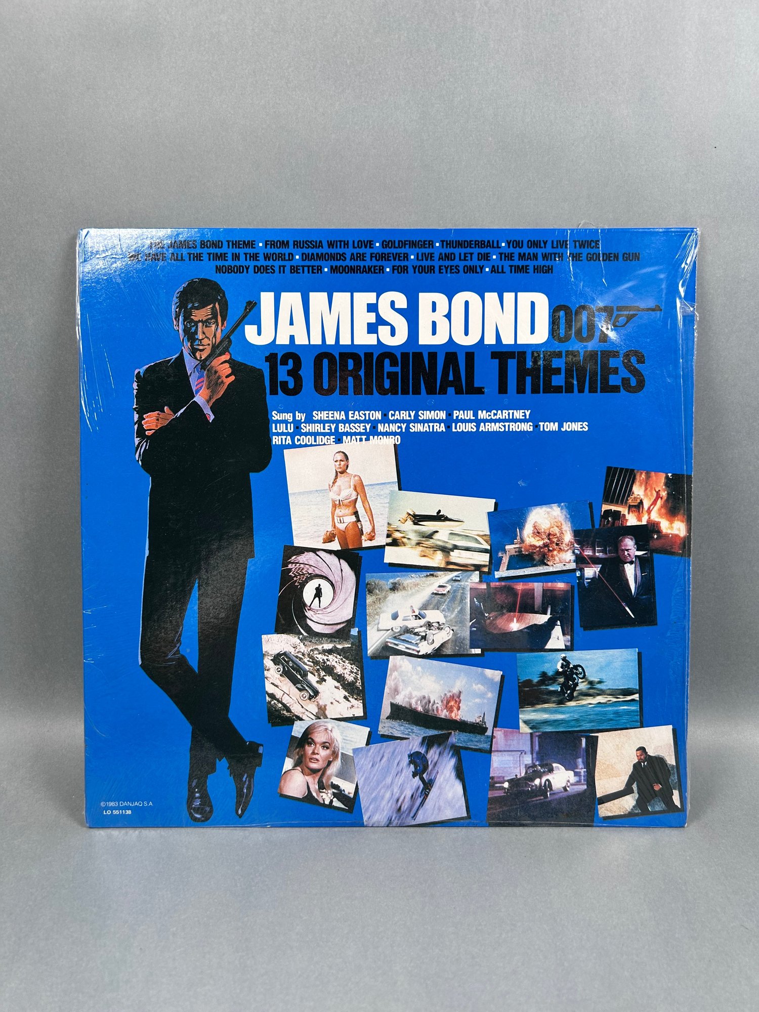 James Bond 13 Original Themes Vinyl Record #81671 | Auctionninja.com