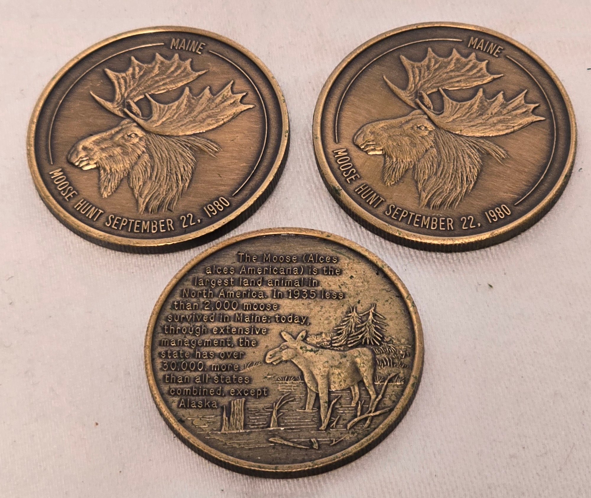 3 Vintage 1980 Moose Hunt Coins #4628 | Auctionninja.com
