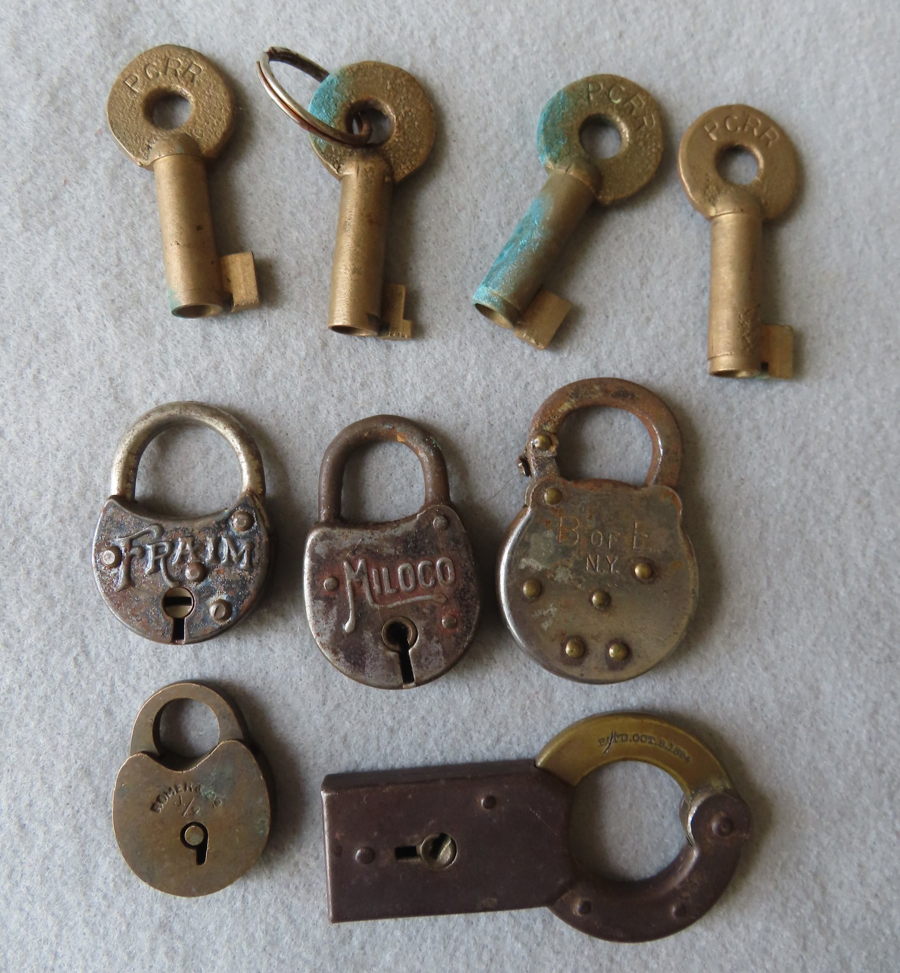 Grouping Of 5 Miniature Locks, And 4 Keys (3 Keys Signed PCRR). One ...