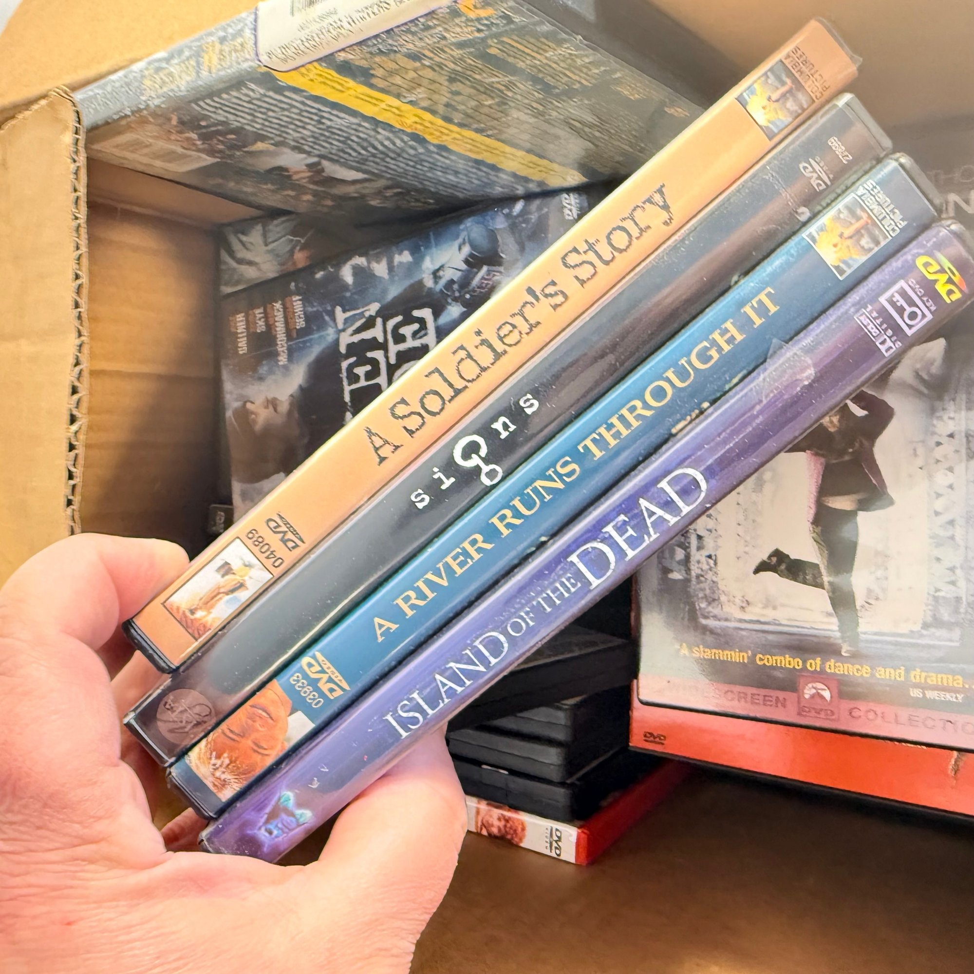 2 Boxes Of DVDS *Not All Titles Are Shown #6228 | Auctionninja.com