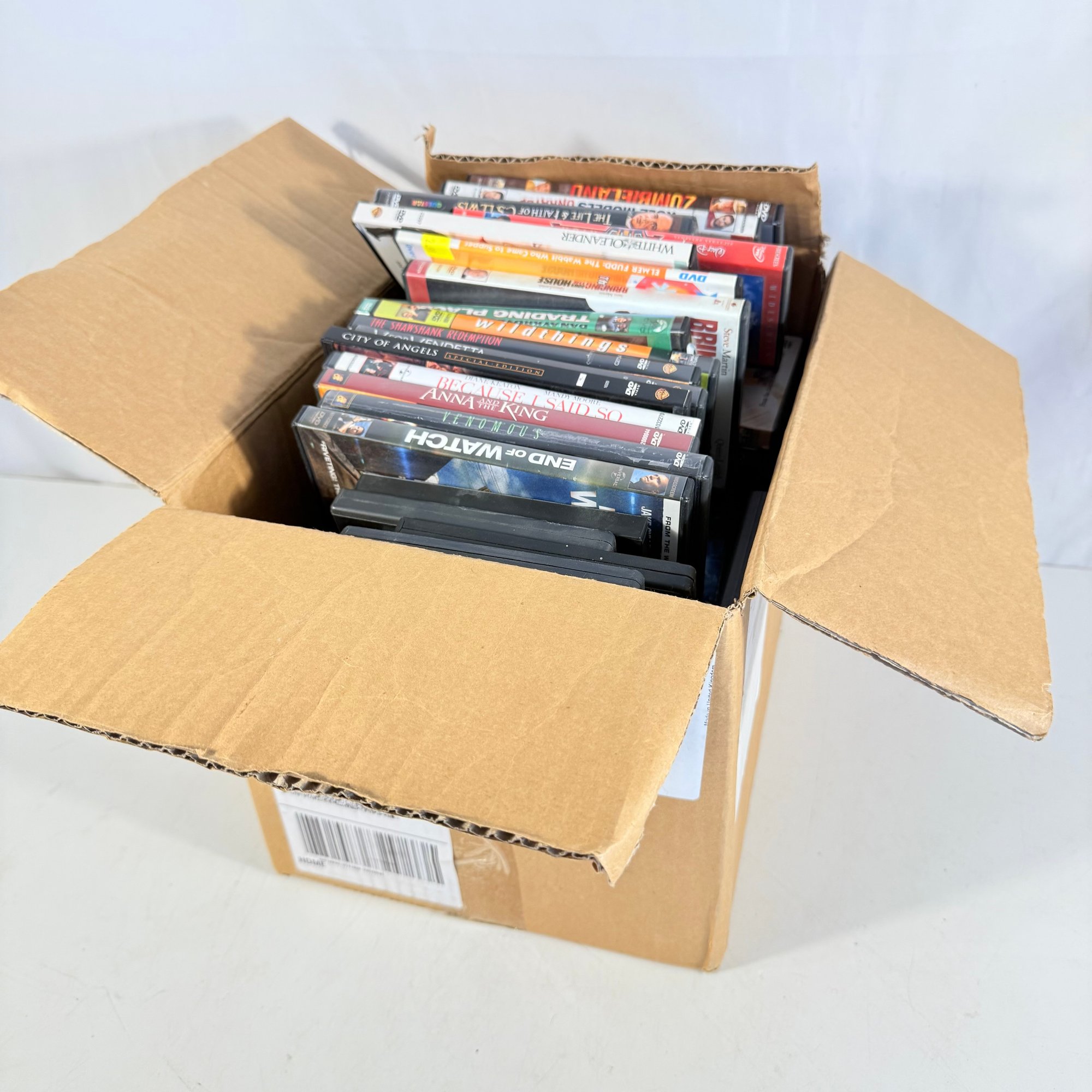 2 Boxes Of DVDS *Not All Titles Are Shown #6228 | Auctionninja.com