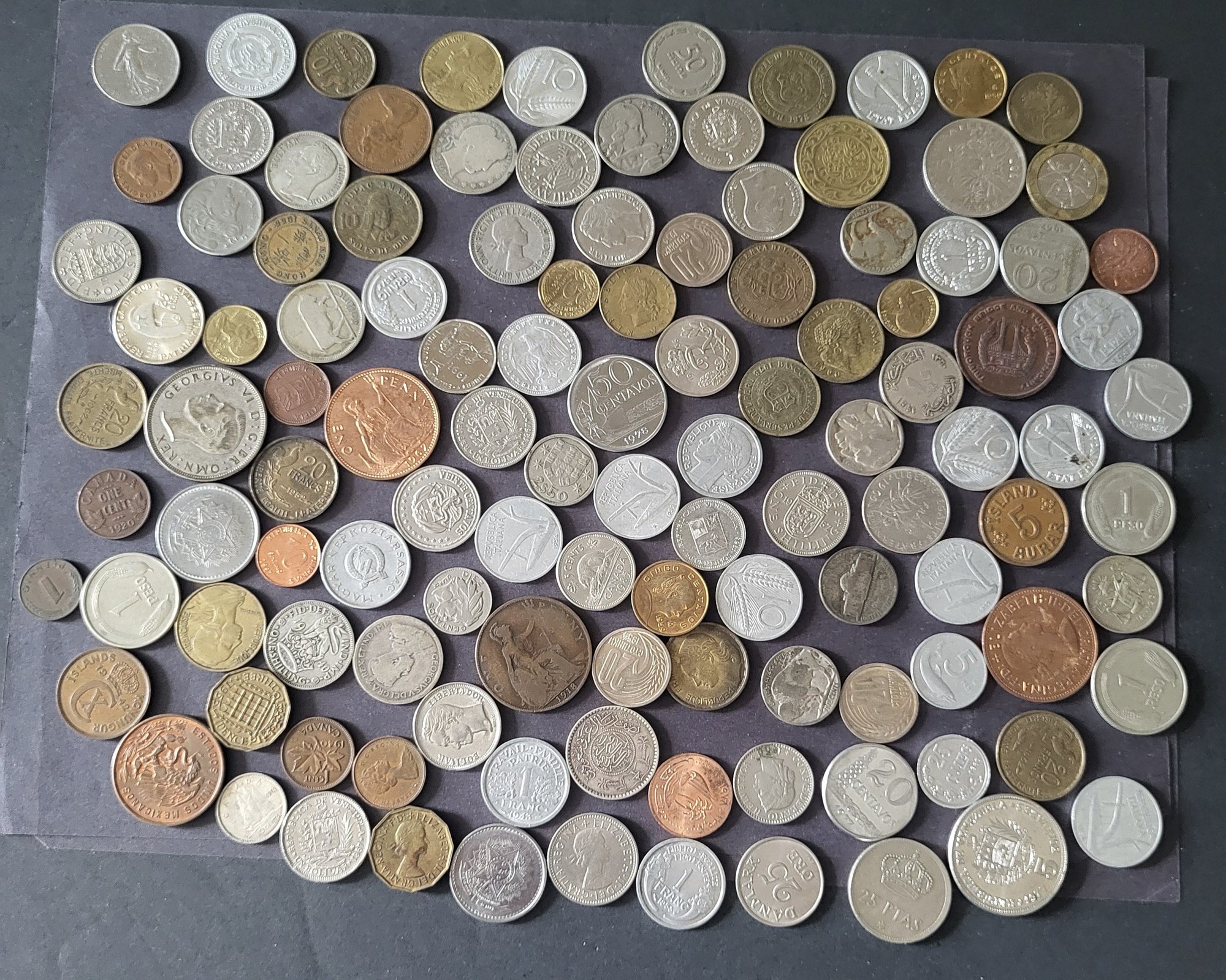 ASSORTED BAG OF FOREIGN COINS #18100 | Auctionninja.com