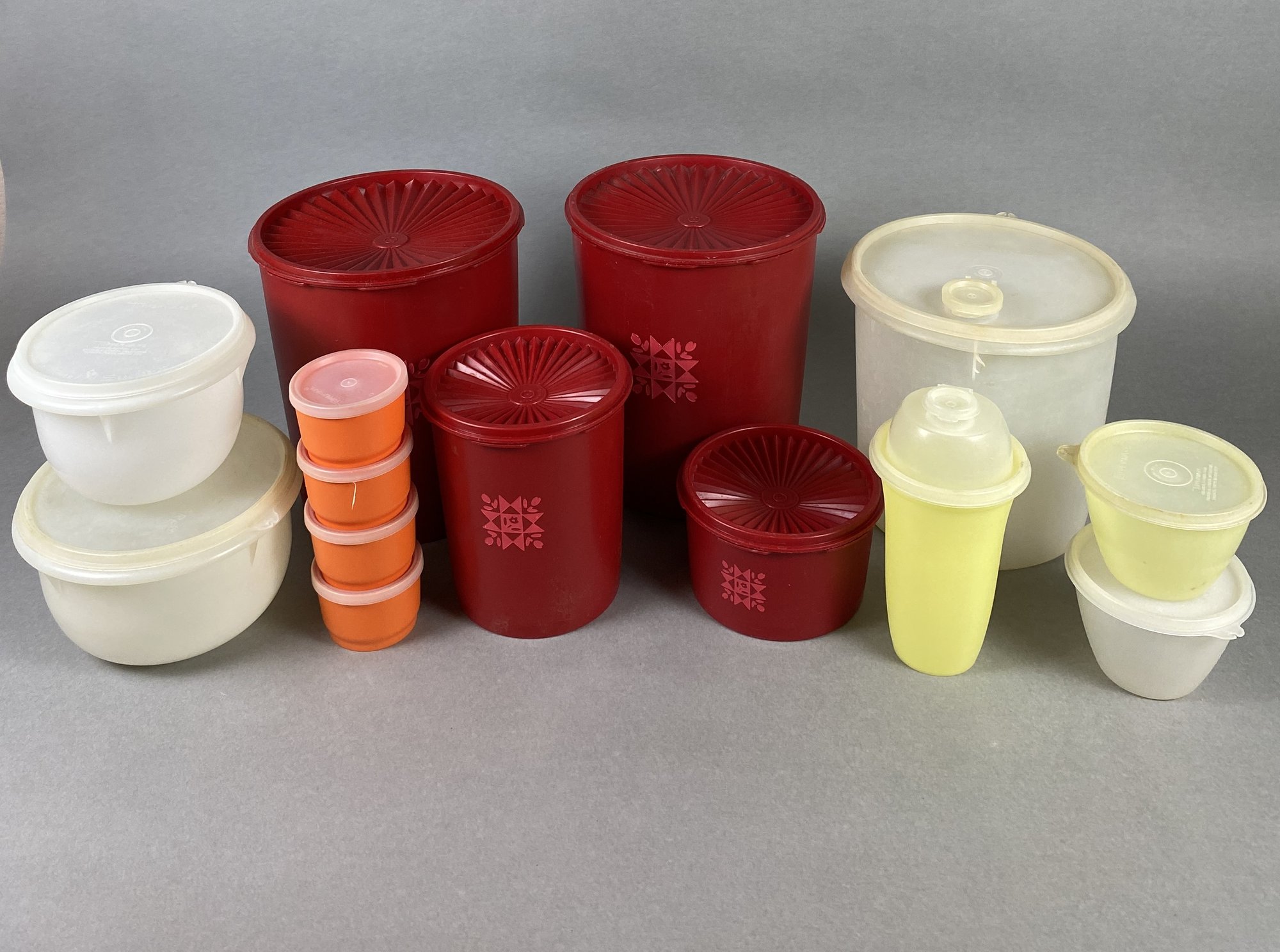 Many Pieces Of Vintage Tupperware Including A Four-piece Canister Set ...