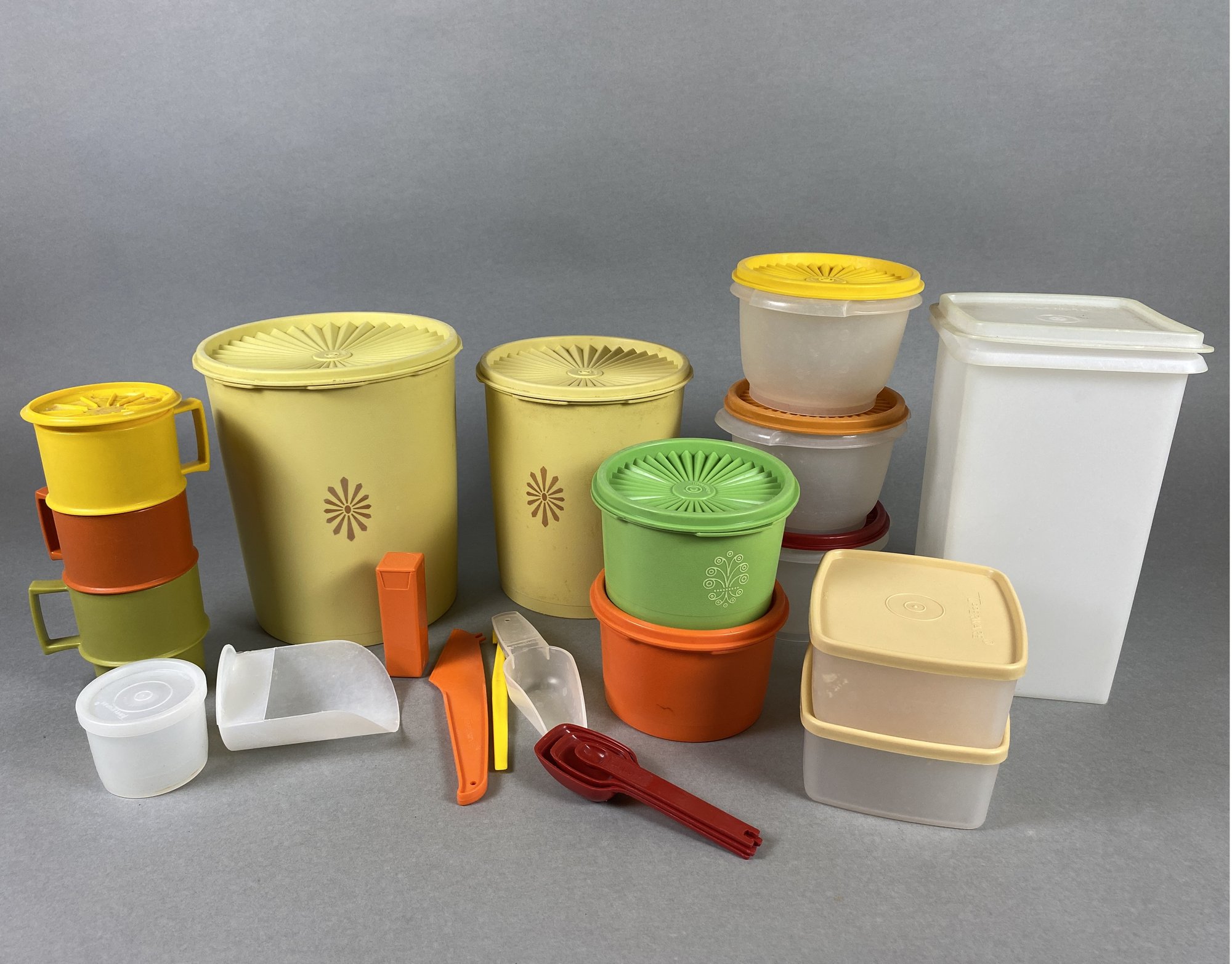Many Pieces Of Vintage Tupperware Including A Two-piece Canister Set ...