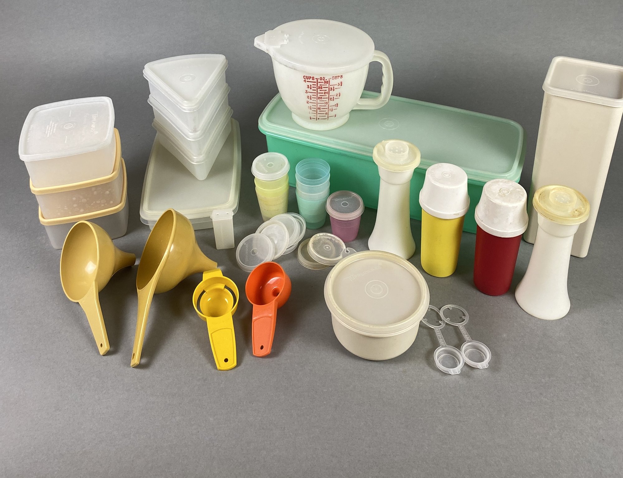 Many Pieces Of Vintage Tupperware Including Pie Containers, Funnels, A ...