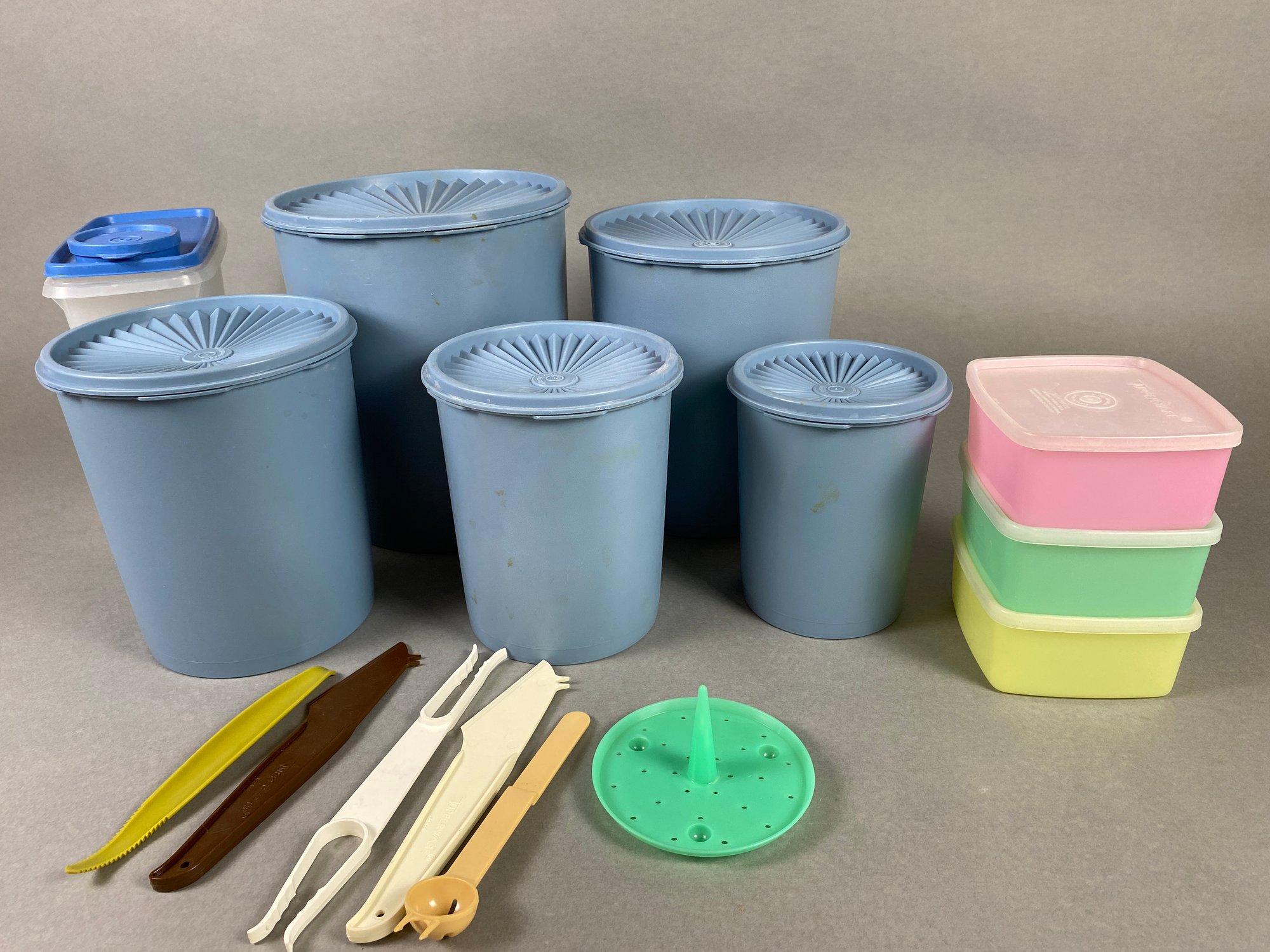 Many Pieces Of Vintage Tupperware Including A Five-piece Canister Set ...