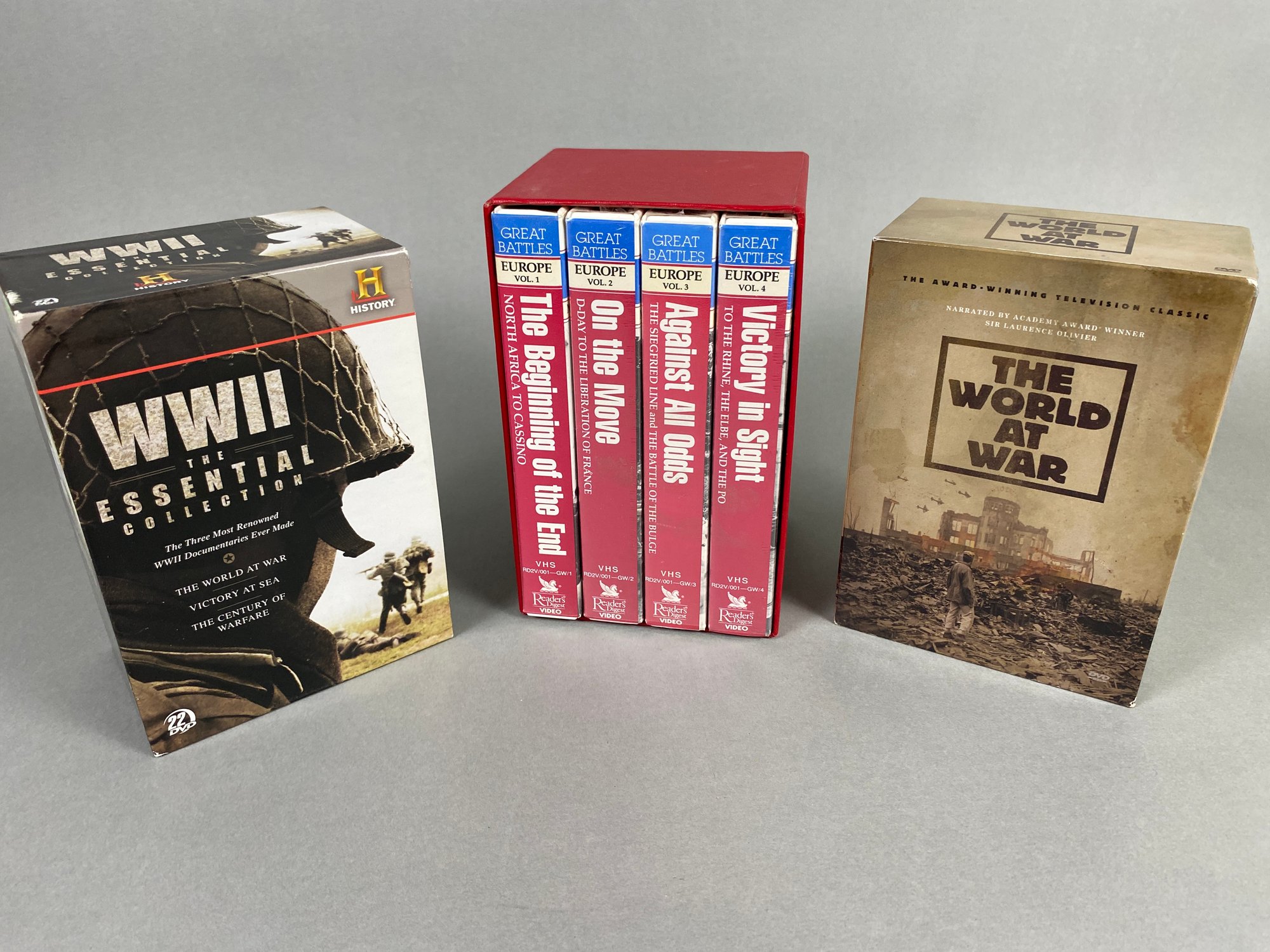 Two Boxes DVD Sets On WWII And One Boxed Set Of VHS Tapes Of The Great ...
