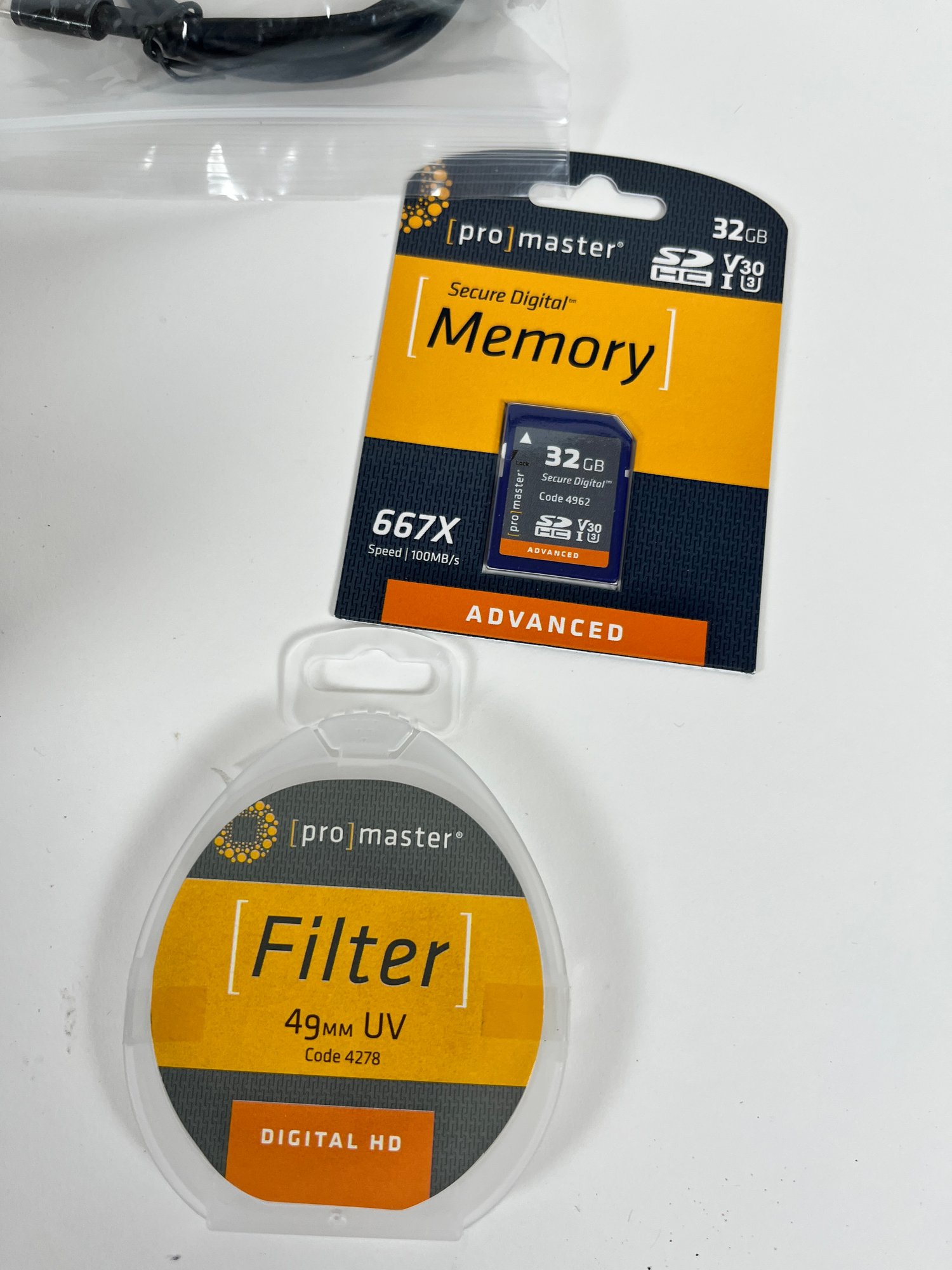 New In Box Canon EOS R100 Camera With New Memory Card, And 49mm UV ...