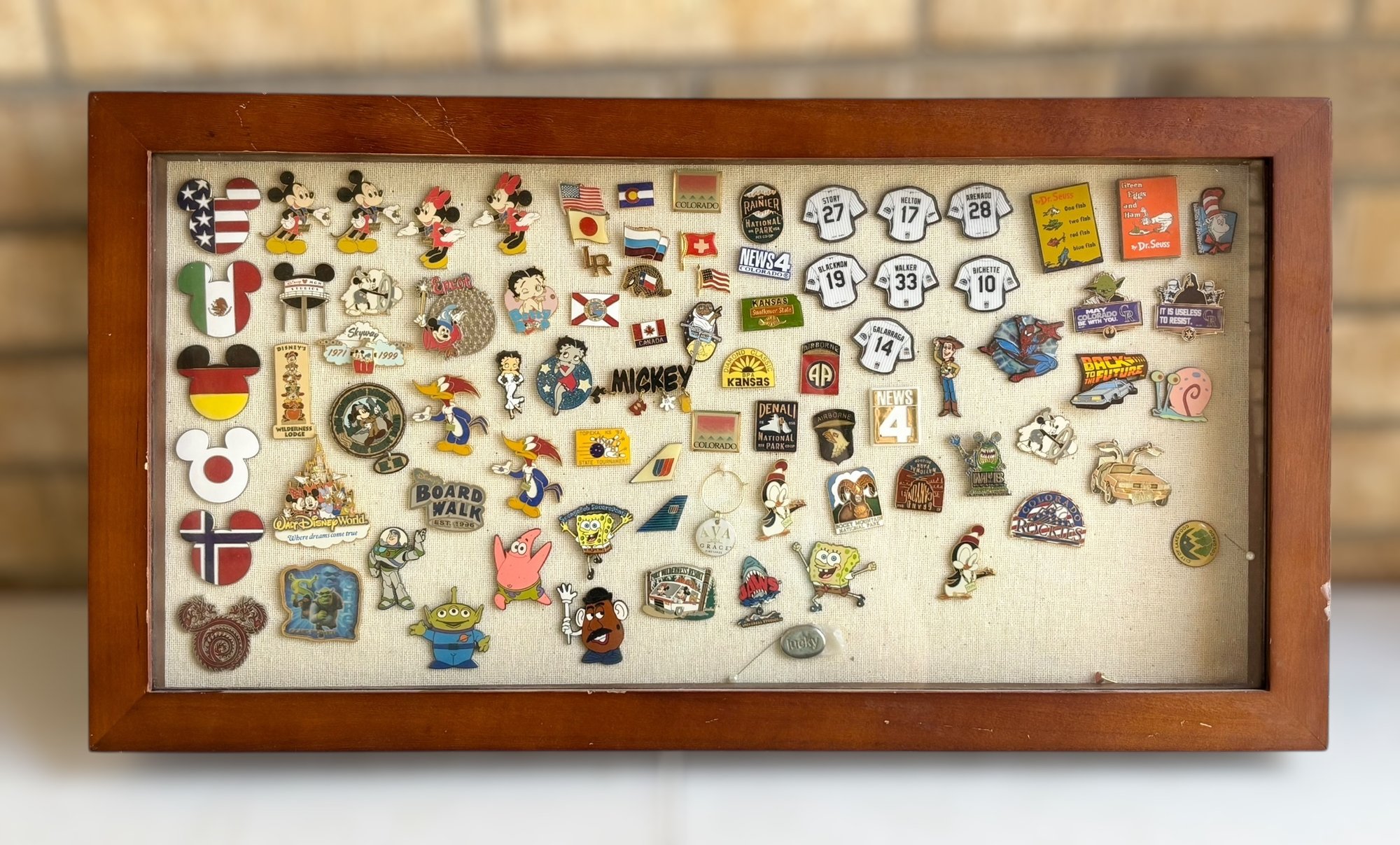 Framed Assortment Of Collectible Pins W/ Disney, Pixar, Cartoons ...