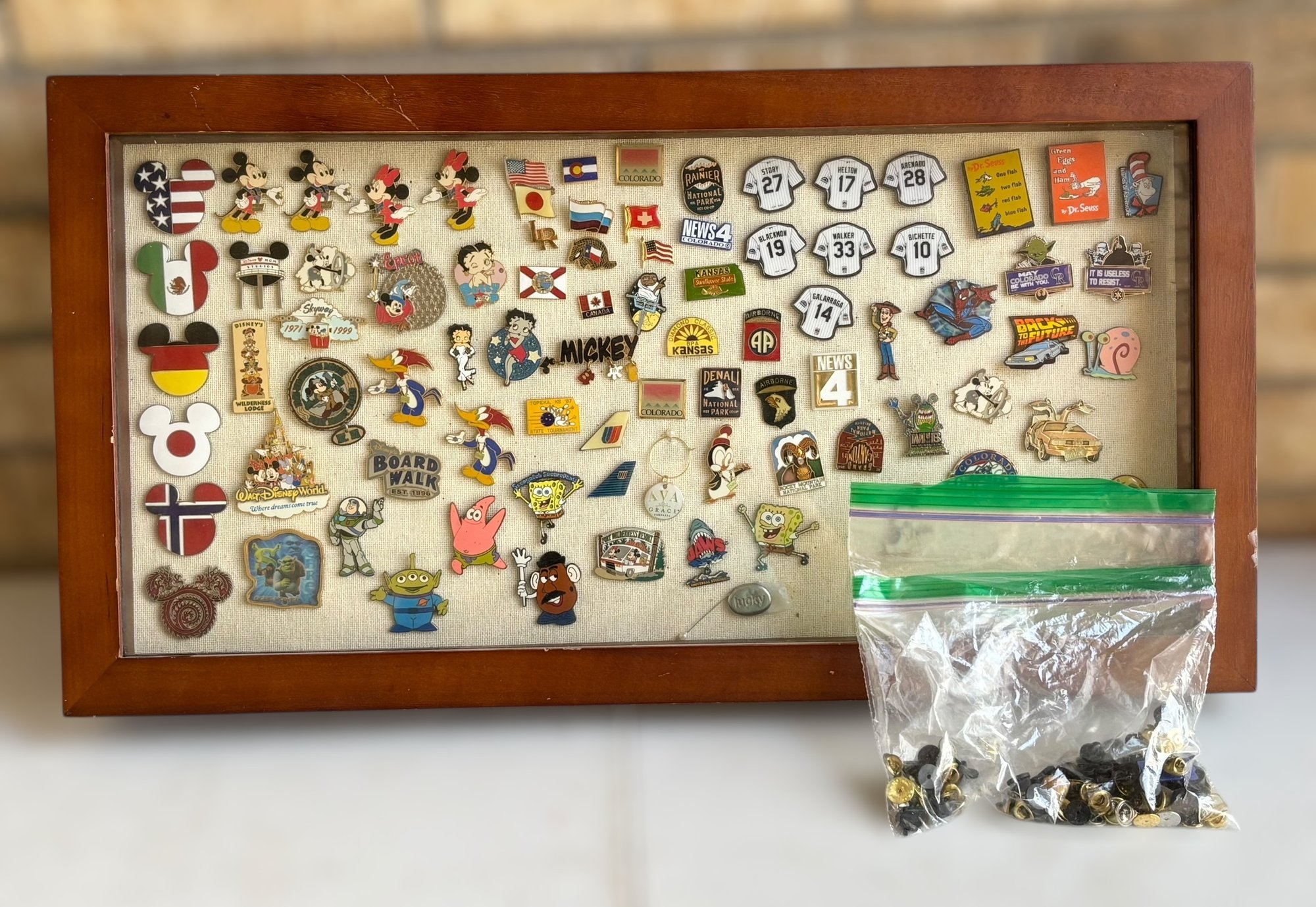 Framed Assortment Of Collectible Pins W/ Disney, Pixar, Cartoons ...